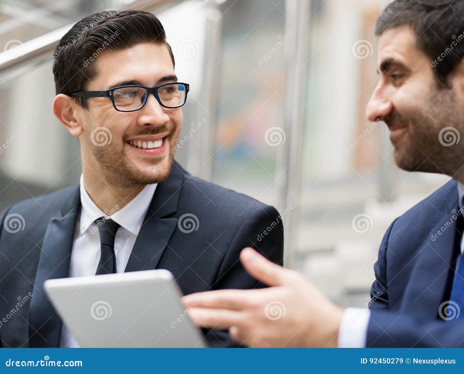 Two Businessmen Talking Outdoors Stock Image - Image of occupation ...