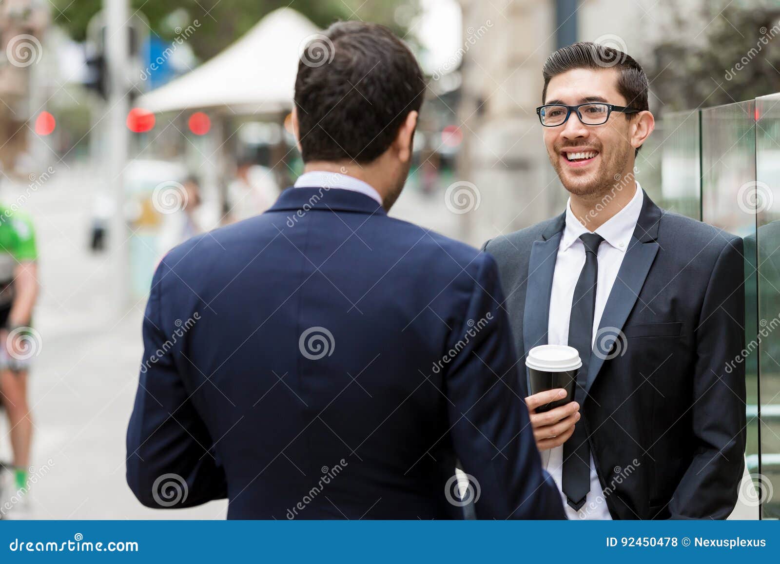 Two Businessmen Talking Outdoors Stock Photo - Image of horizontal ...