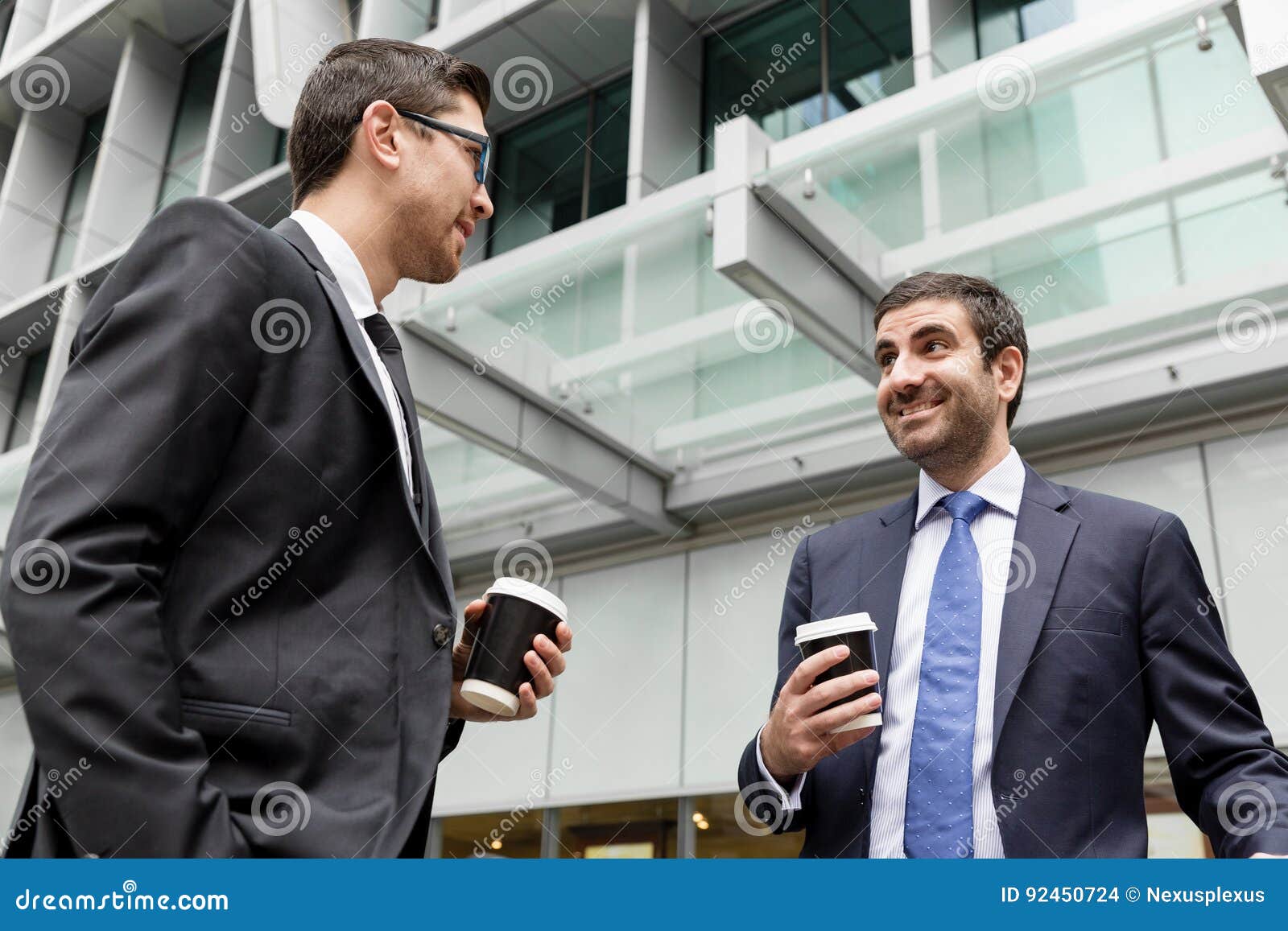 Two Businessmen Talking Outdoors Stock Photo - Image of standing ...
