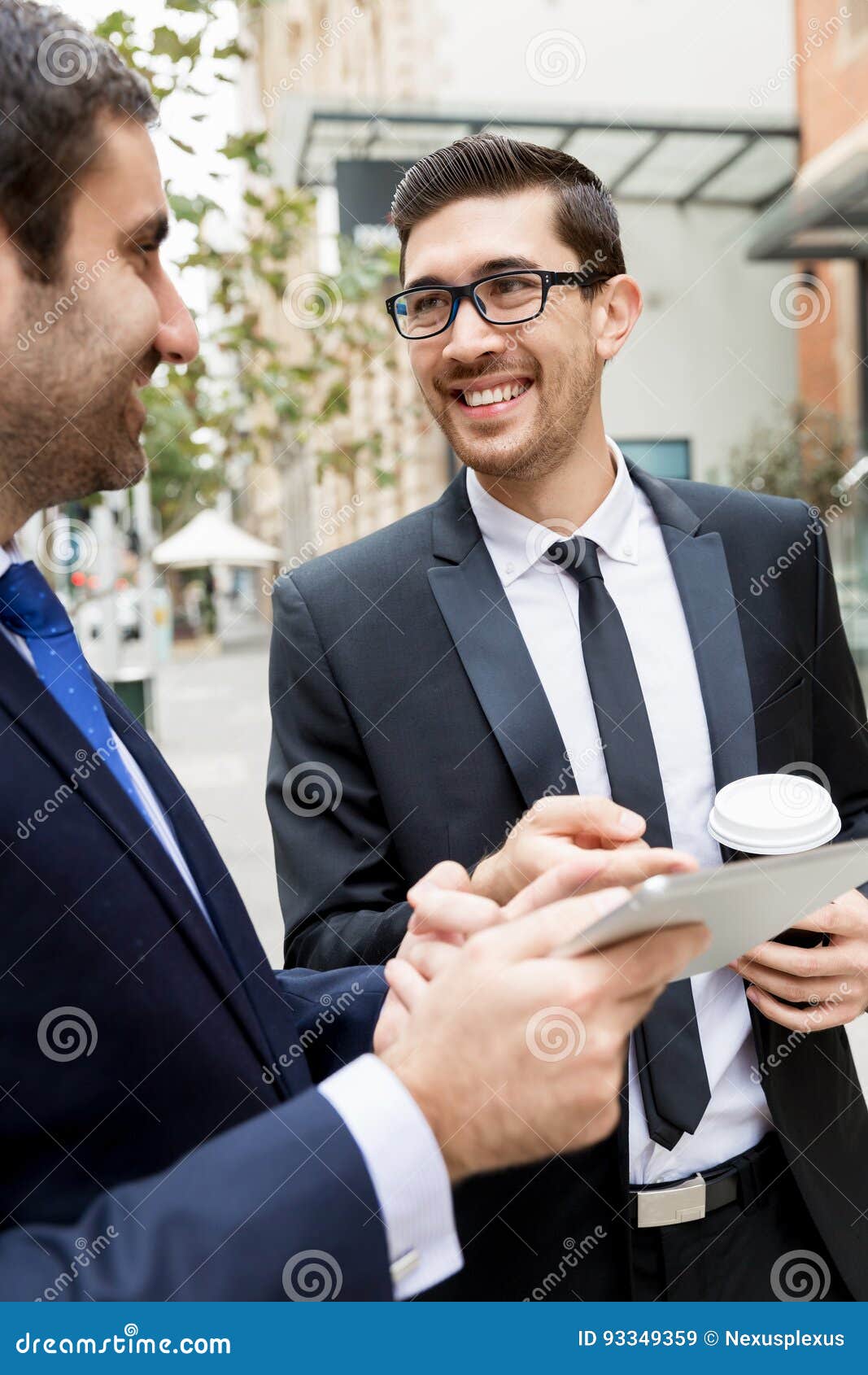 Two Businessmen Talking Outdoors Stock Image - Image of talking ...