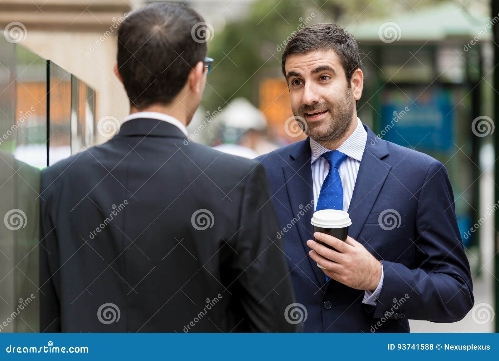 Two Businessmen Talking Outdoors Stock Photo - Image of businessman ...