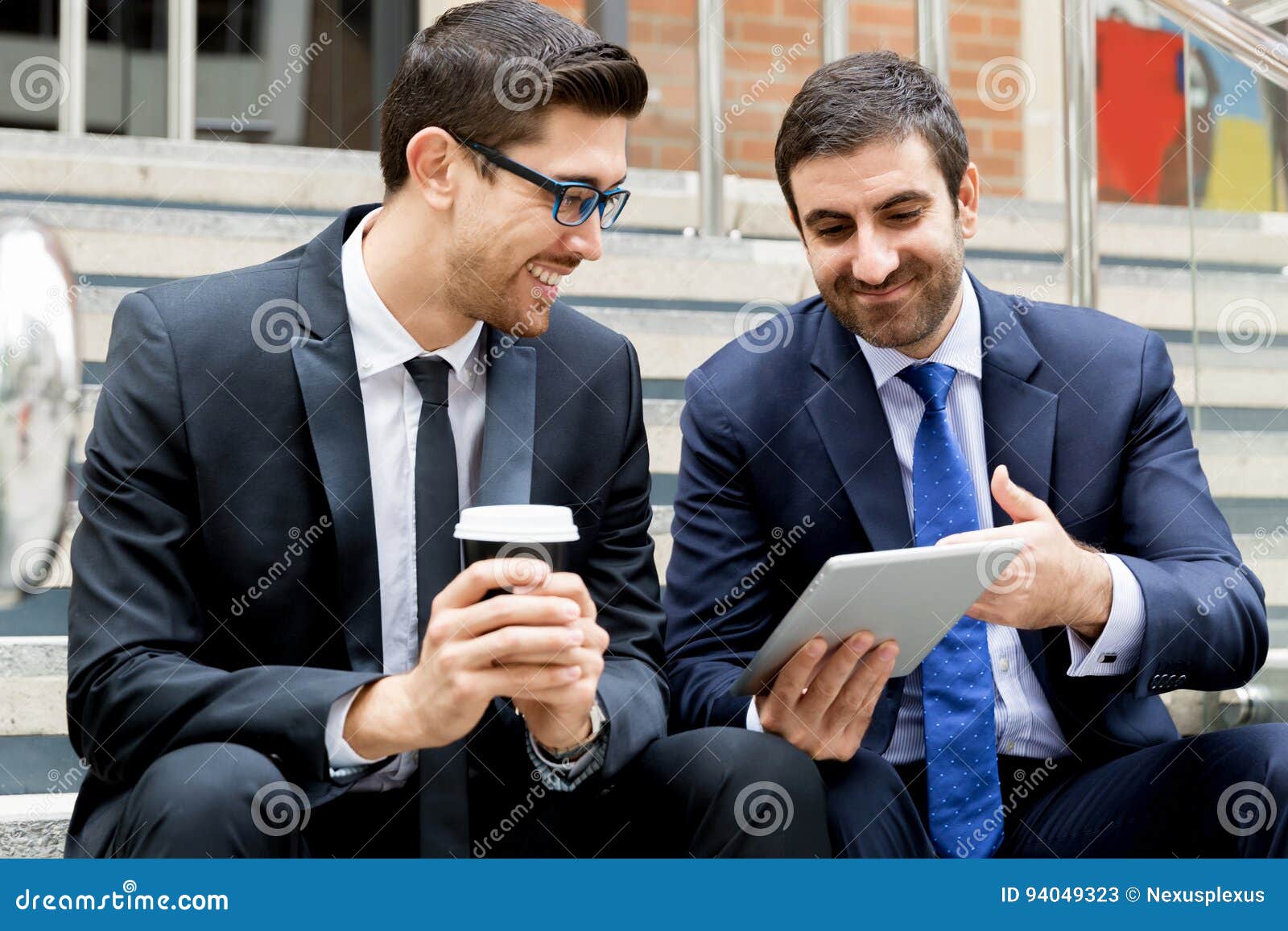 Two Businessmen Talking Outdoors Stock Image - Image of talking ...