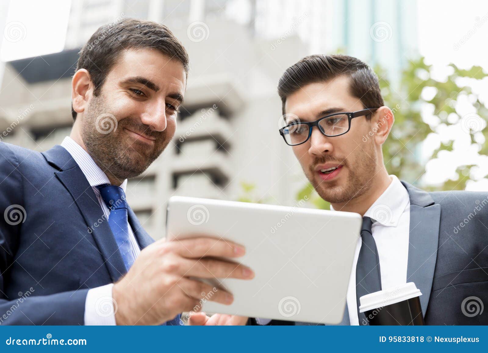 Two Businessmen Talking Outdoors Stock Photo - Image of standing ...