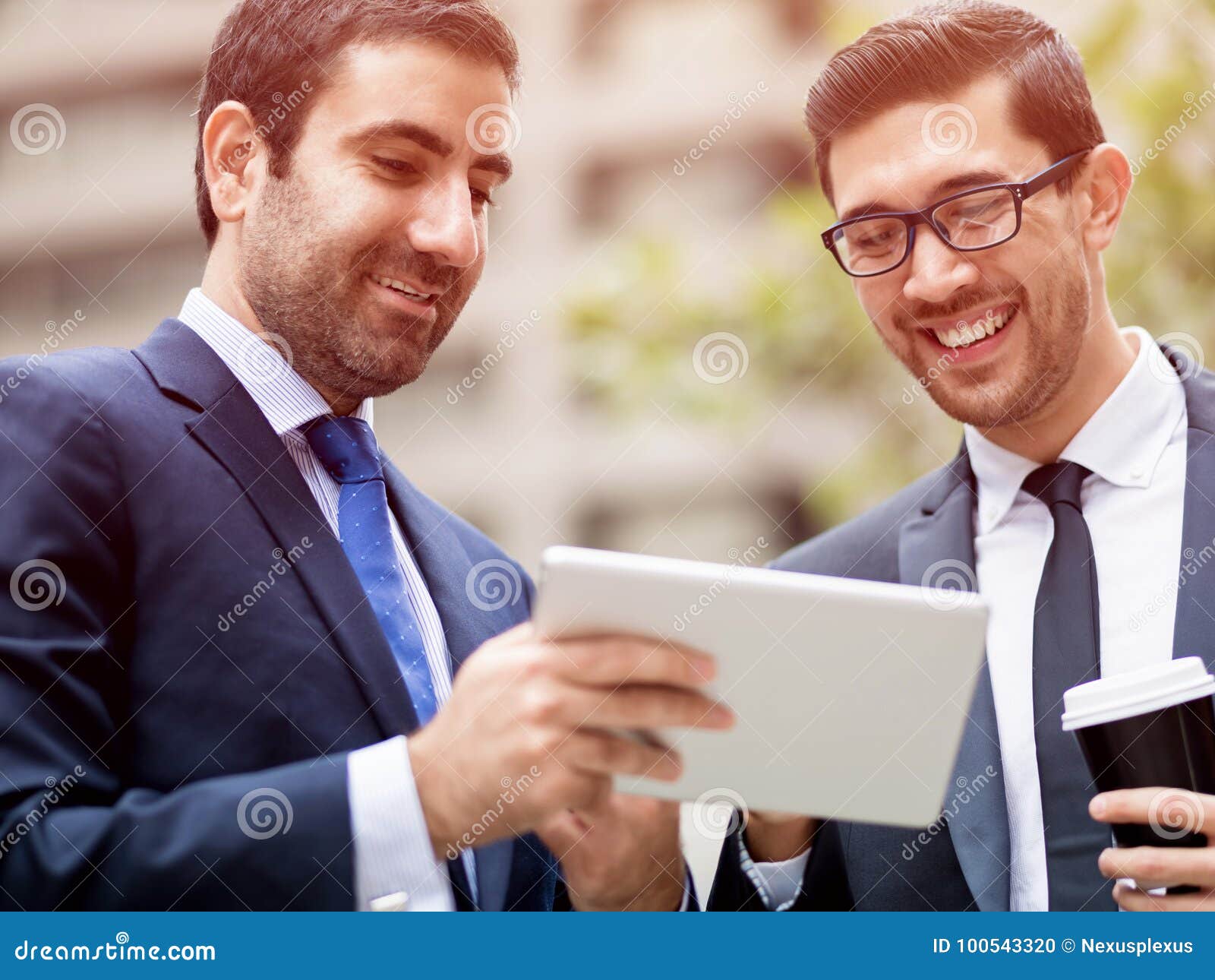Two Businessmen Talking Outdoors Stock Photo - Image of caucasian ...