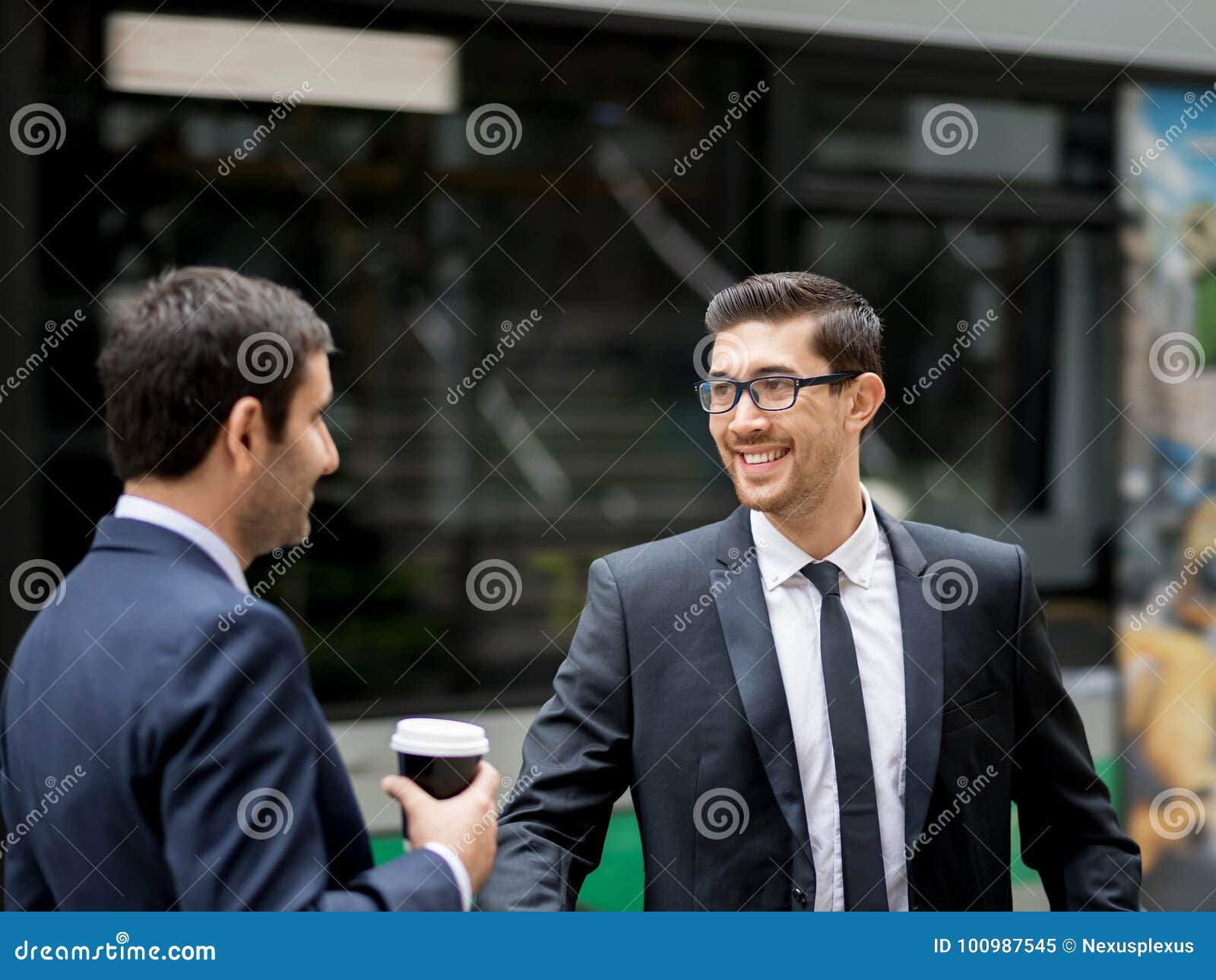 Two Businessmen Talking Outdoors Stock Image - Image of happy, chatting ...