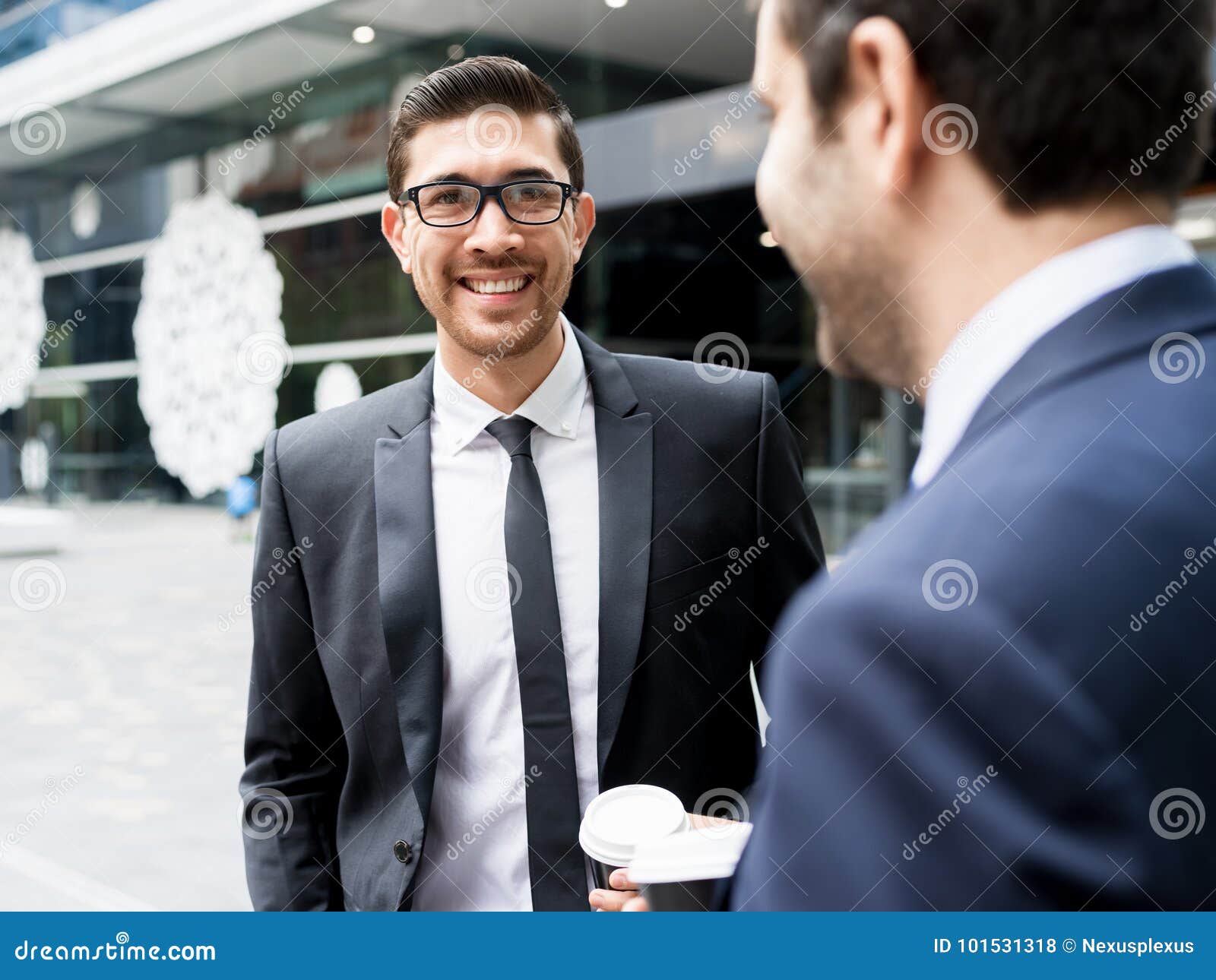 Two Businessmen Talking Outdoors Stock Photo - Image of occupation ...
