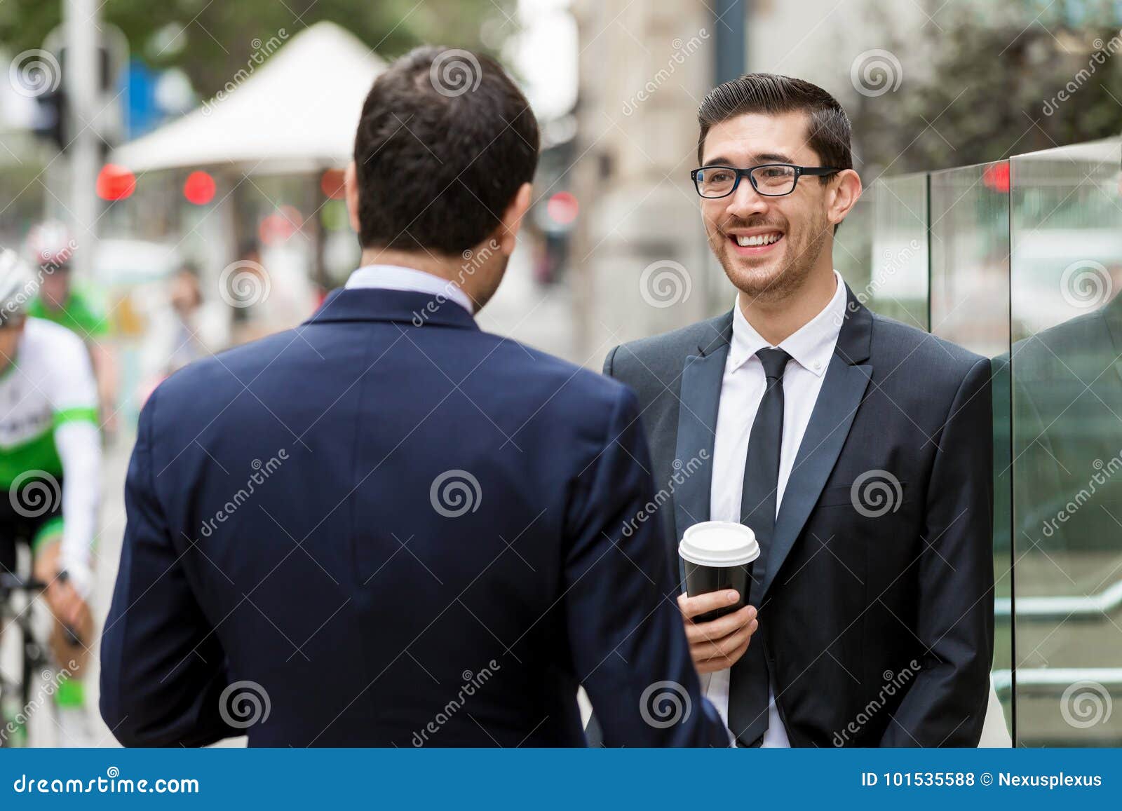 Two Businessmen Talking Outdoors Stock Photo - Image of relationship ...