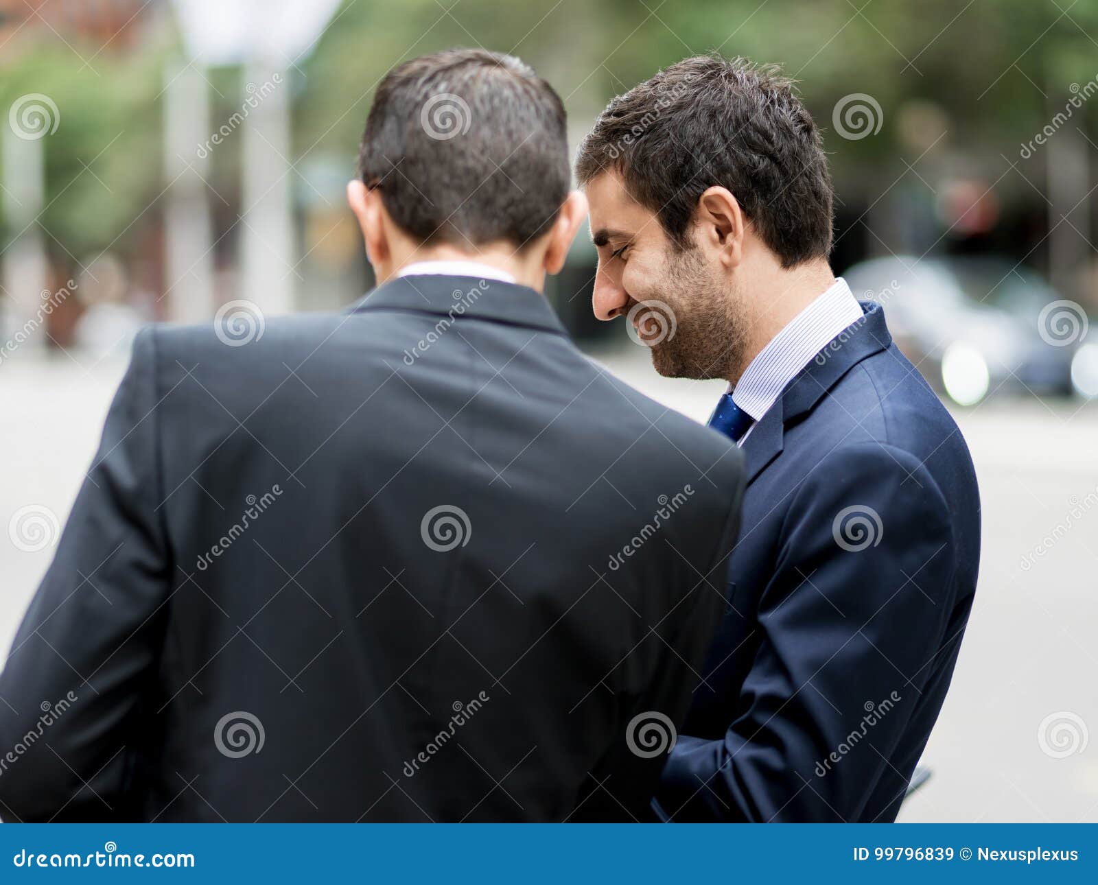 Two Businessmen Talking Outdoors Stock Image - Image of smiling ...
