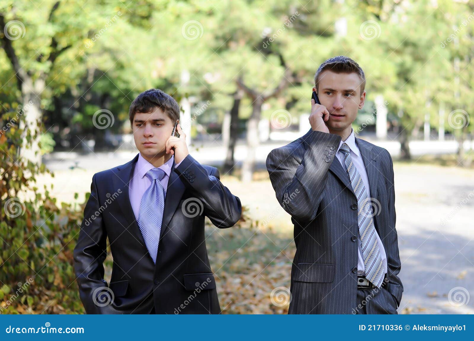 Two Businessmen Talking on the Phone Stock Photo - Image of indoors ...