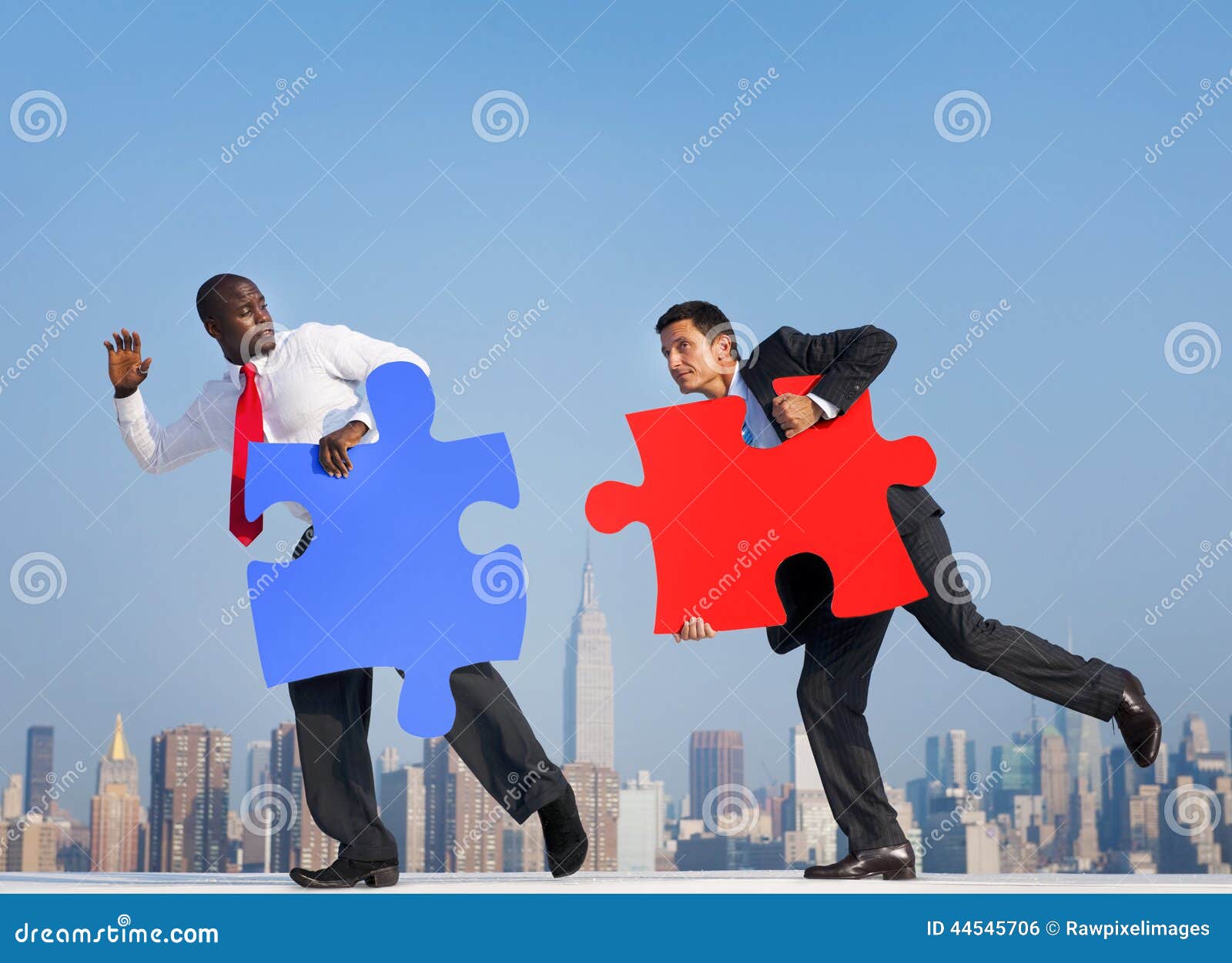 Two Businessmen in an Urban Scene with Puzzle Stock Photo - Image of ...