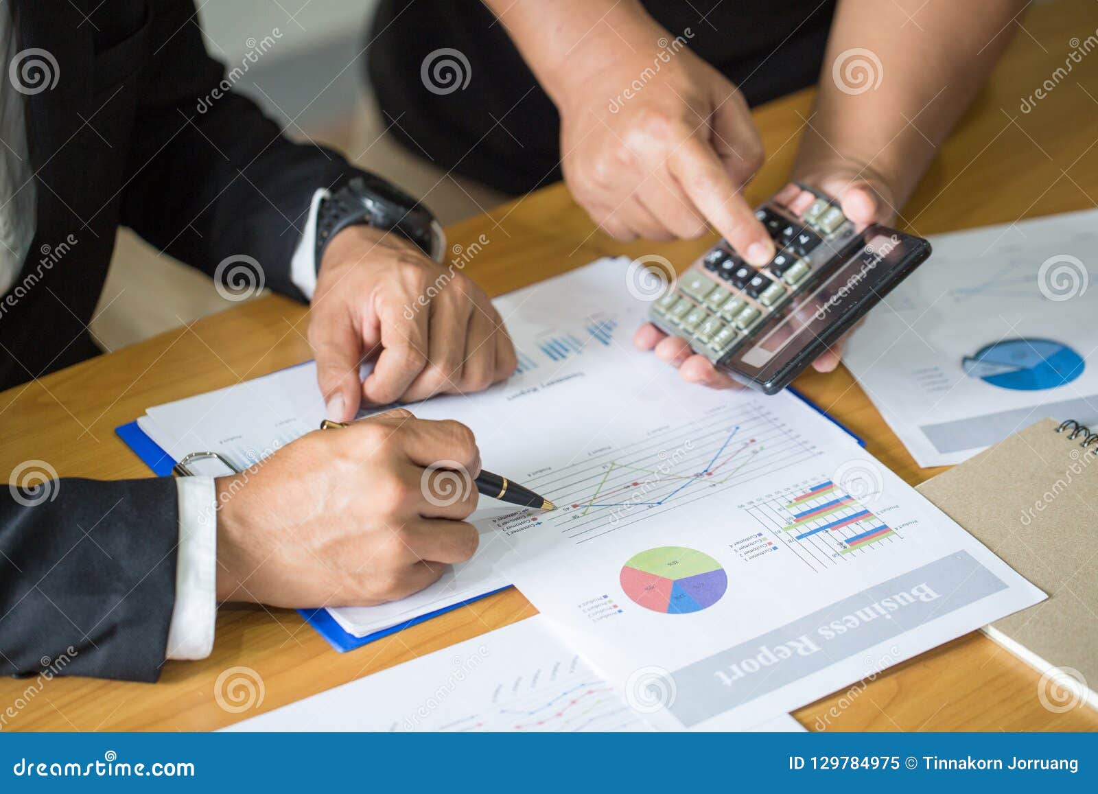 Two Businessmen Working on Graphs in Office, Business Accounting Stock ...