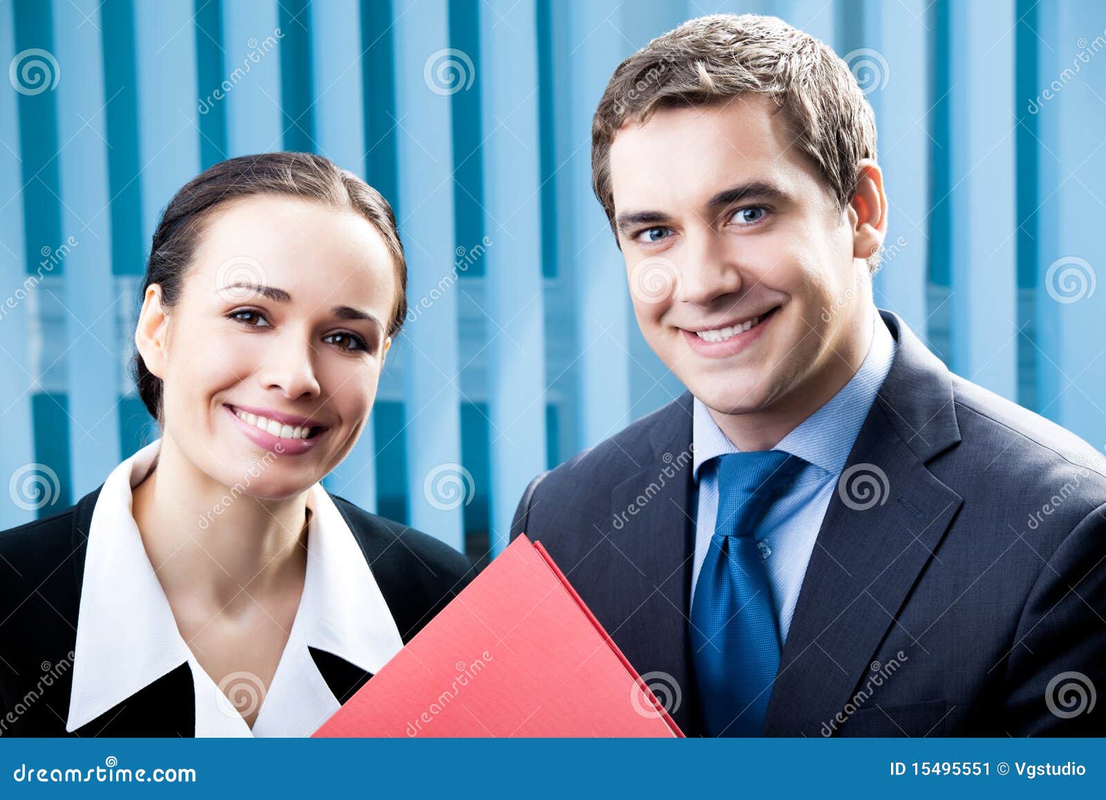 Two businesspeople stock image. Image of leadership, blue - 15495551