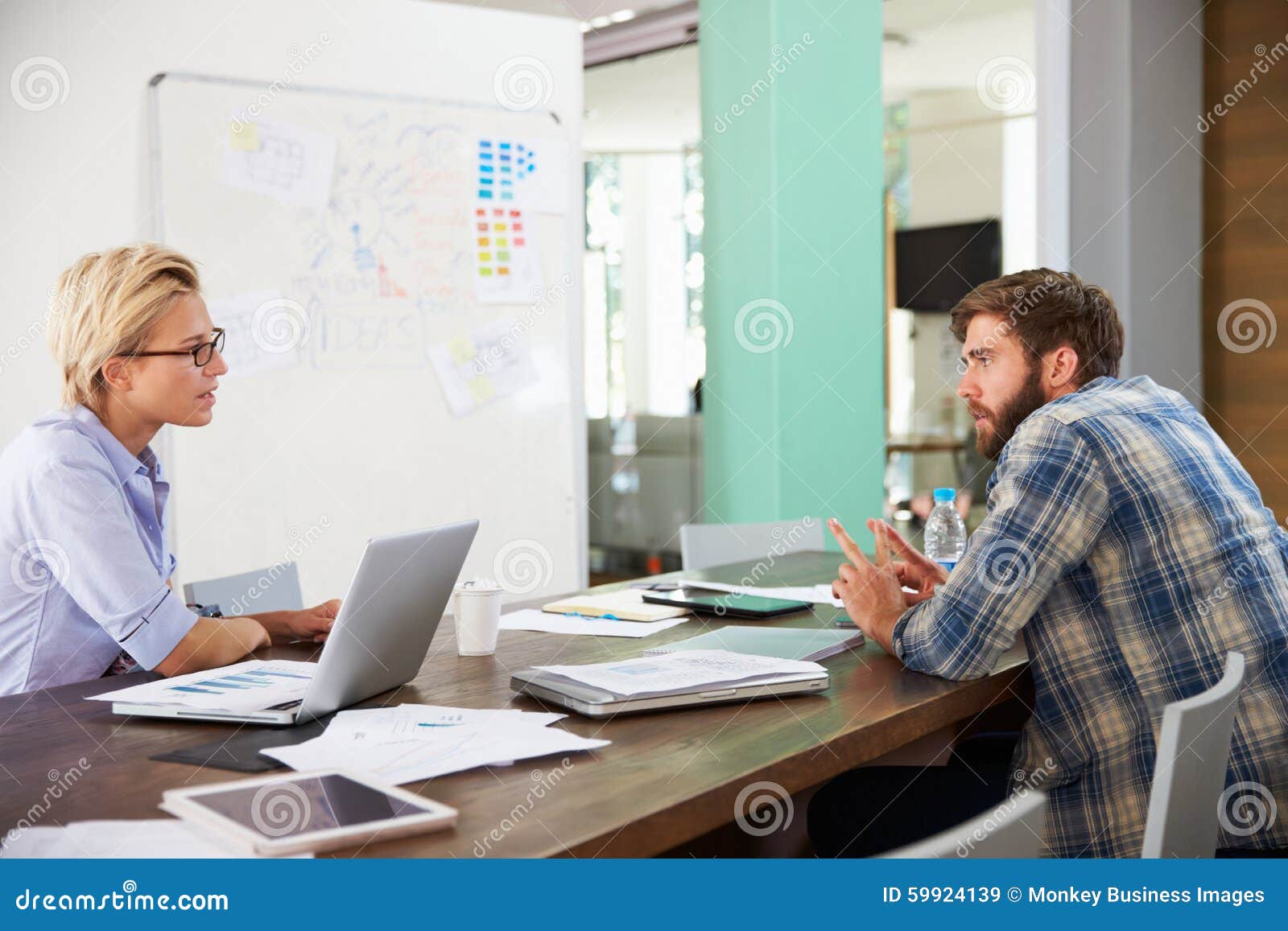 Two Businesspeople Having Creative Meeting in Office Stock Image ...