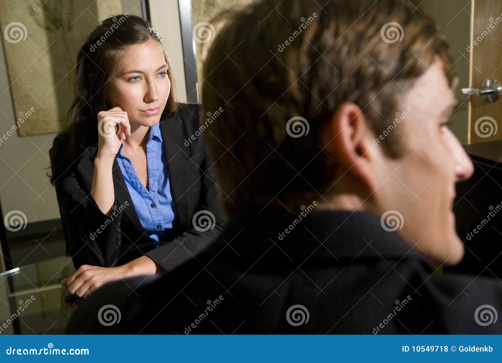 Two Businesspeople Listening in Meeting Stock Photo - Image of male ...