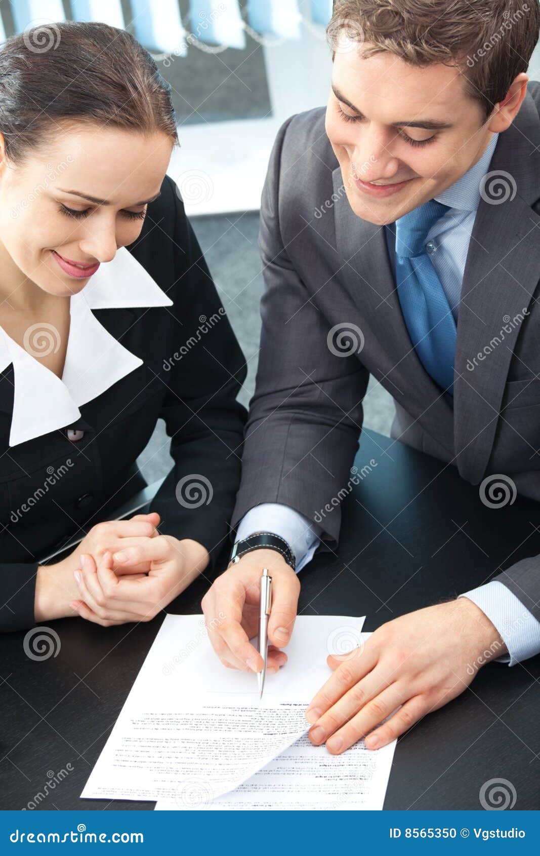 Two Businesspeople at Office Stock Photo - Image of business ...