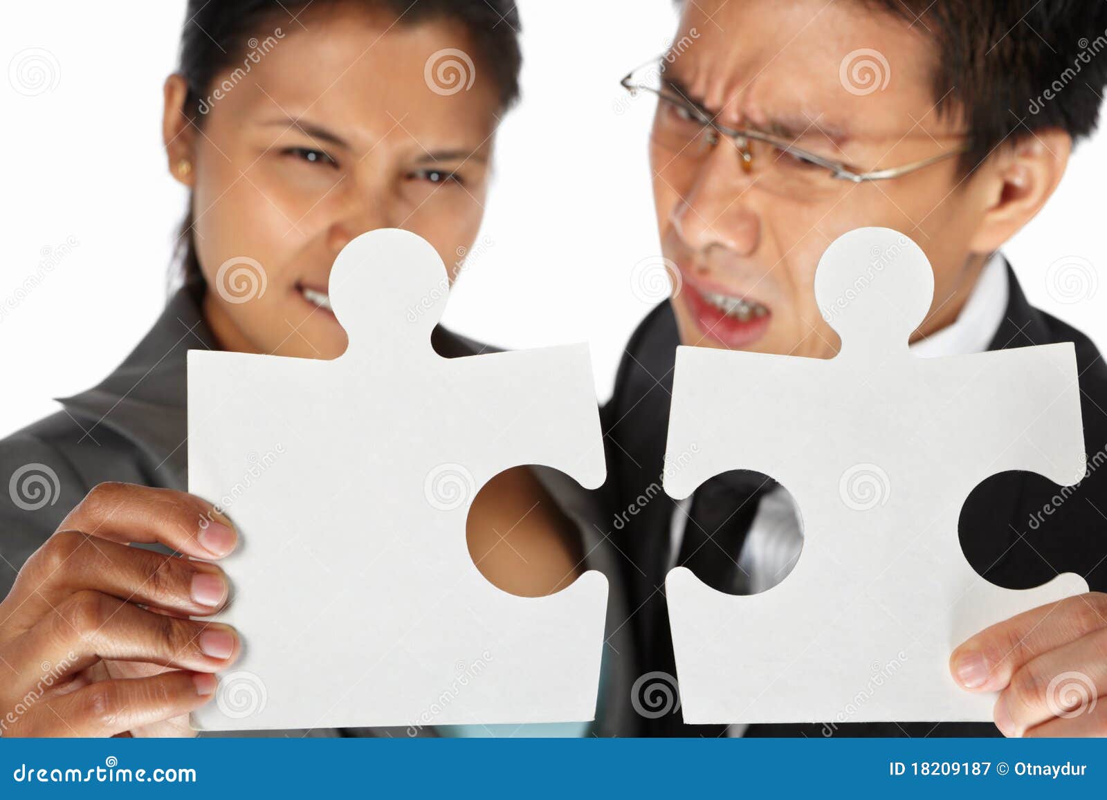 Two Businesspeople Trying To Connect the Puzzle Stock Image - Image of ...