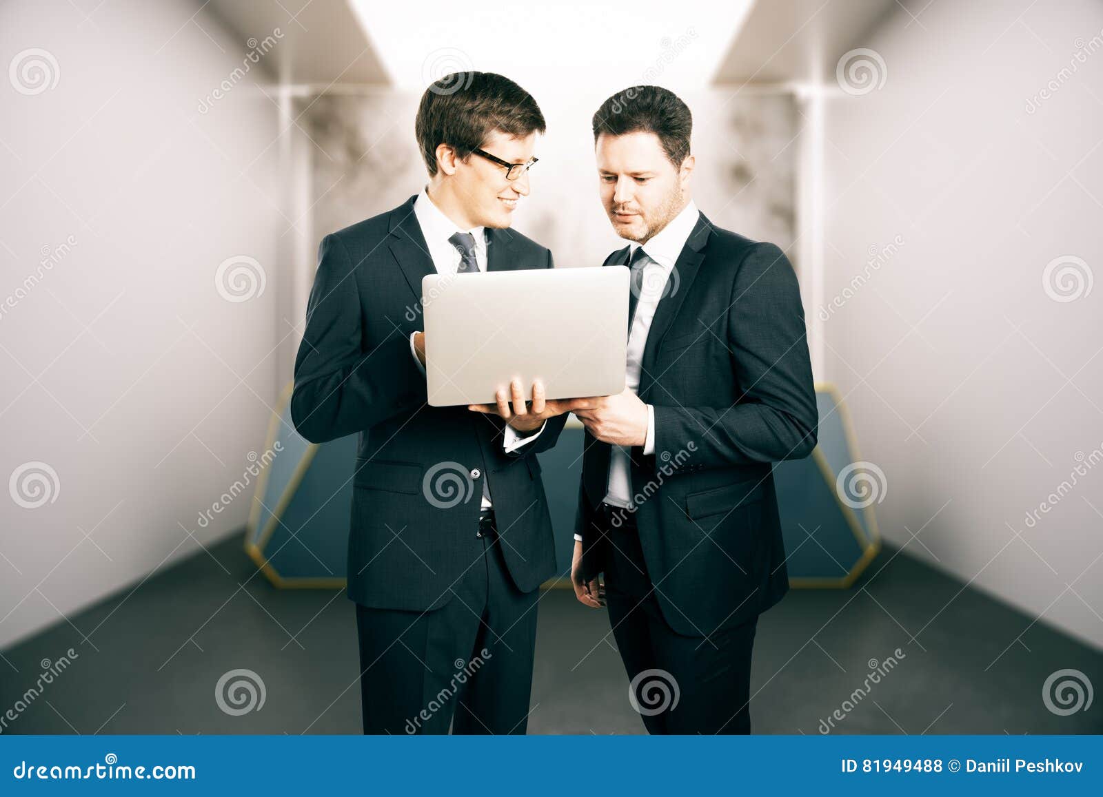 Two Businesspeople Using Laptop Together Stock Photo - Image of happy ...