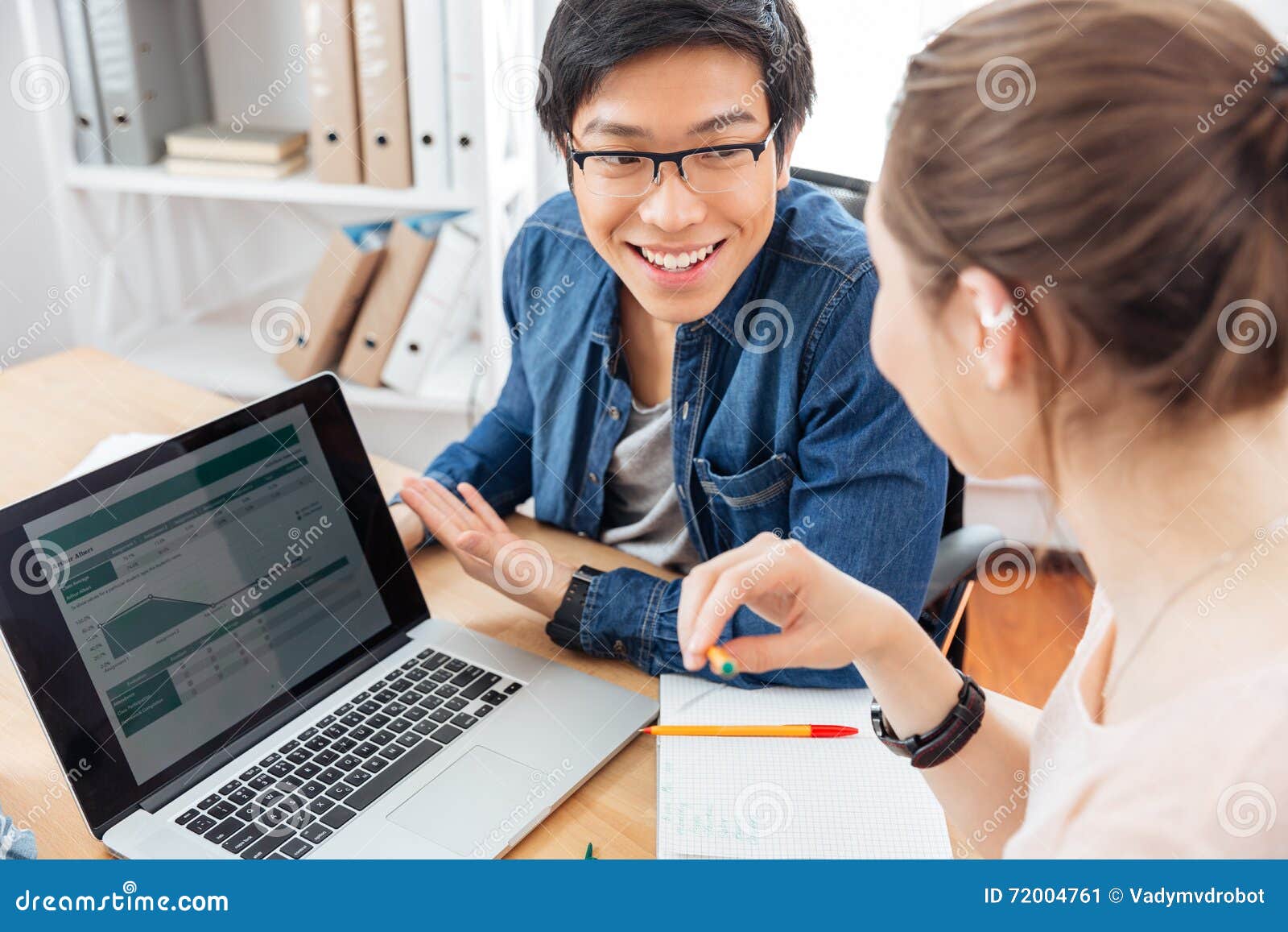 Two Businesspeople Using Laptop and Working Together Stock Image ...