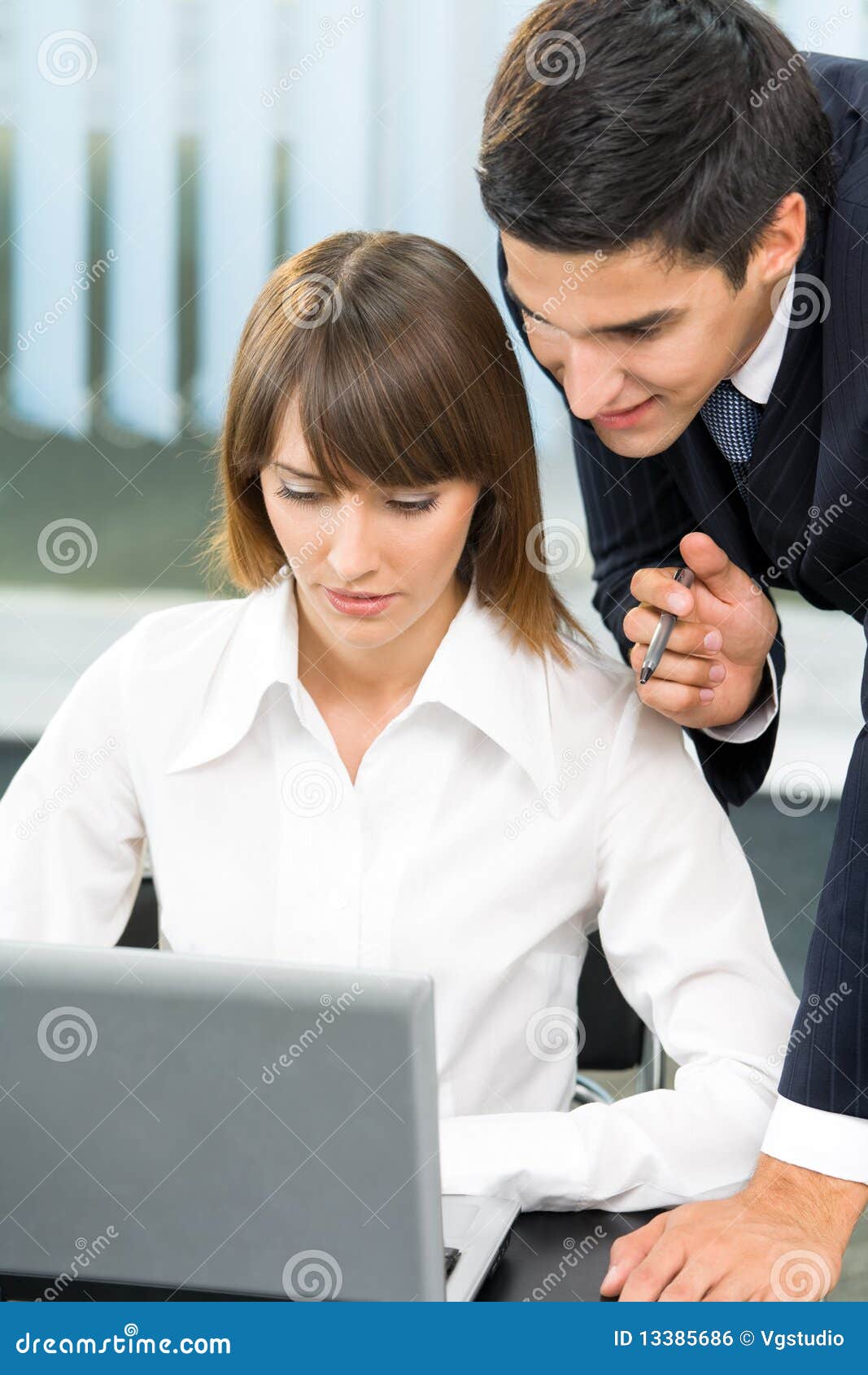 Two businesspeople working stock photo. Image of people - 13385686