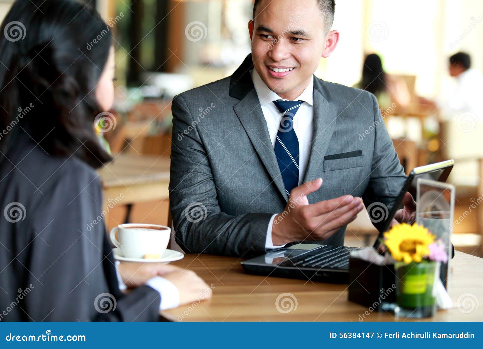 Two Businesss People Talking about Planning Work at Cafe Stock Image ...