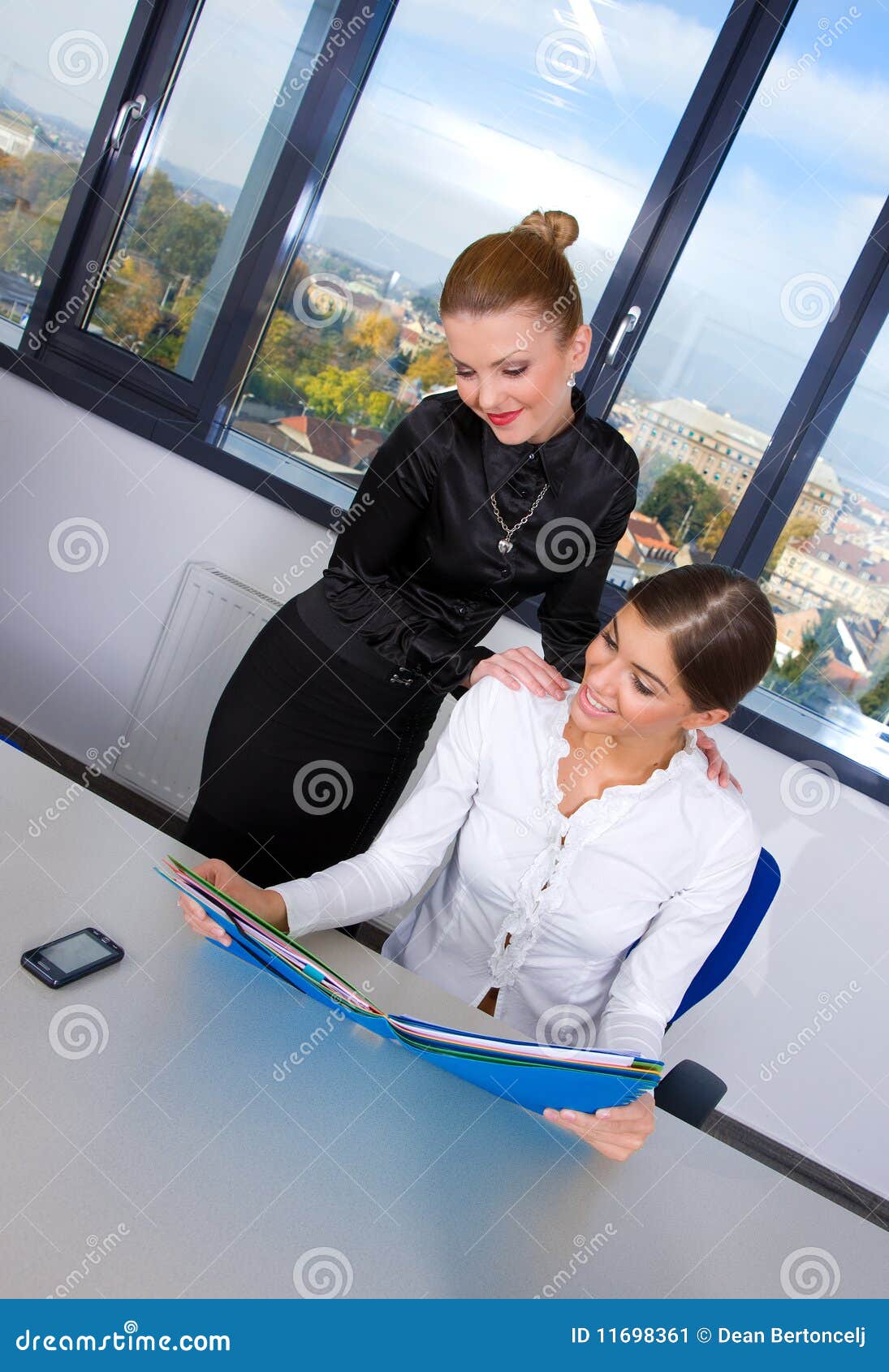 Two businesswoman stock image. Image of secretary, signing - 11698361