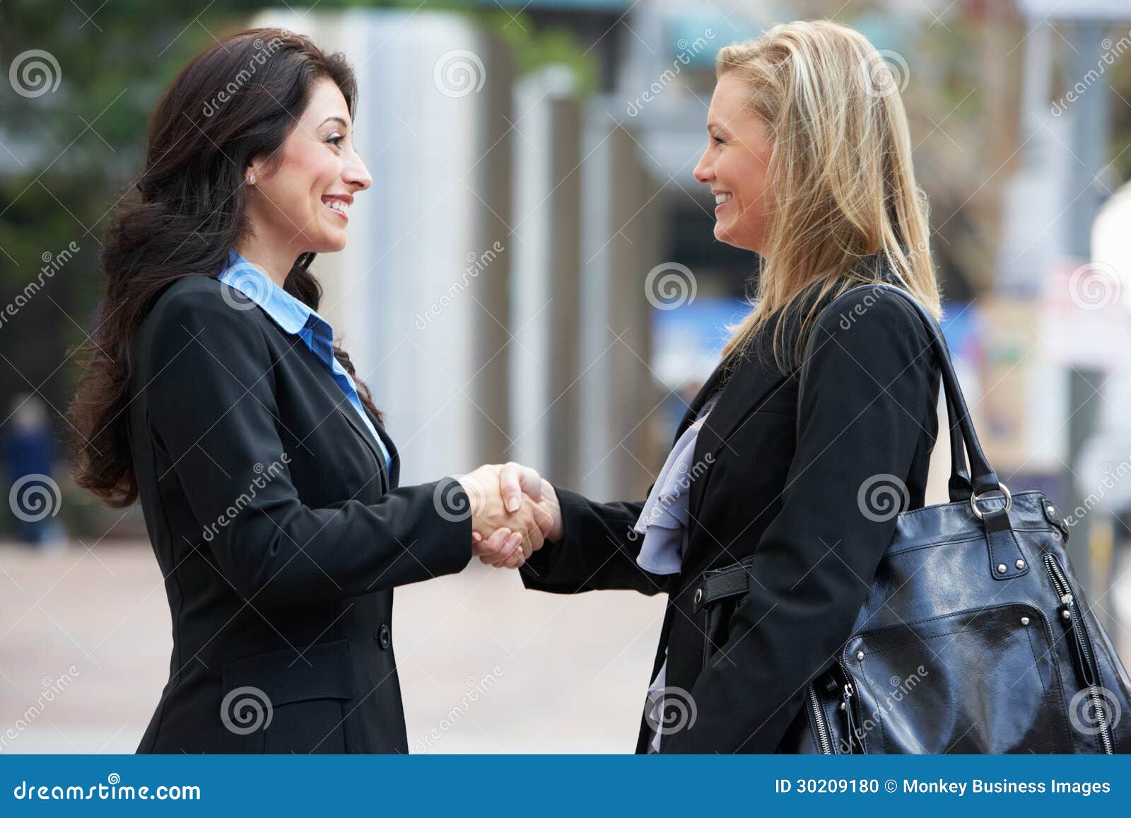 Businesswomen Shaking Hands As Hello In Office, Women Is Enjoying With ...