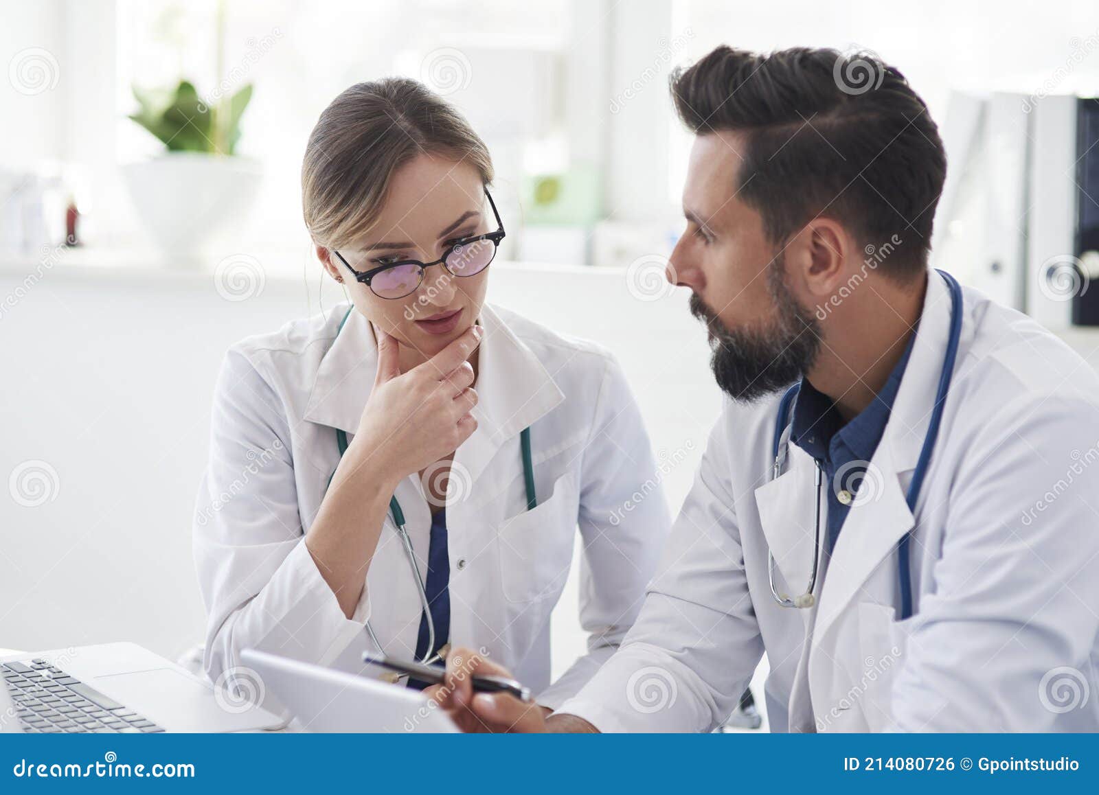 Two Busy Doctors Talking in Doctorâ€™s Office Stock Photo - Image of ...