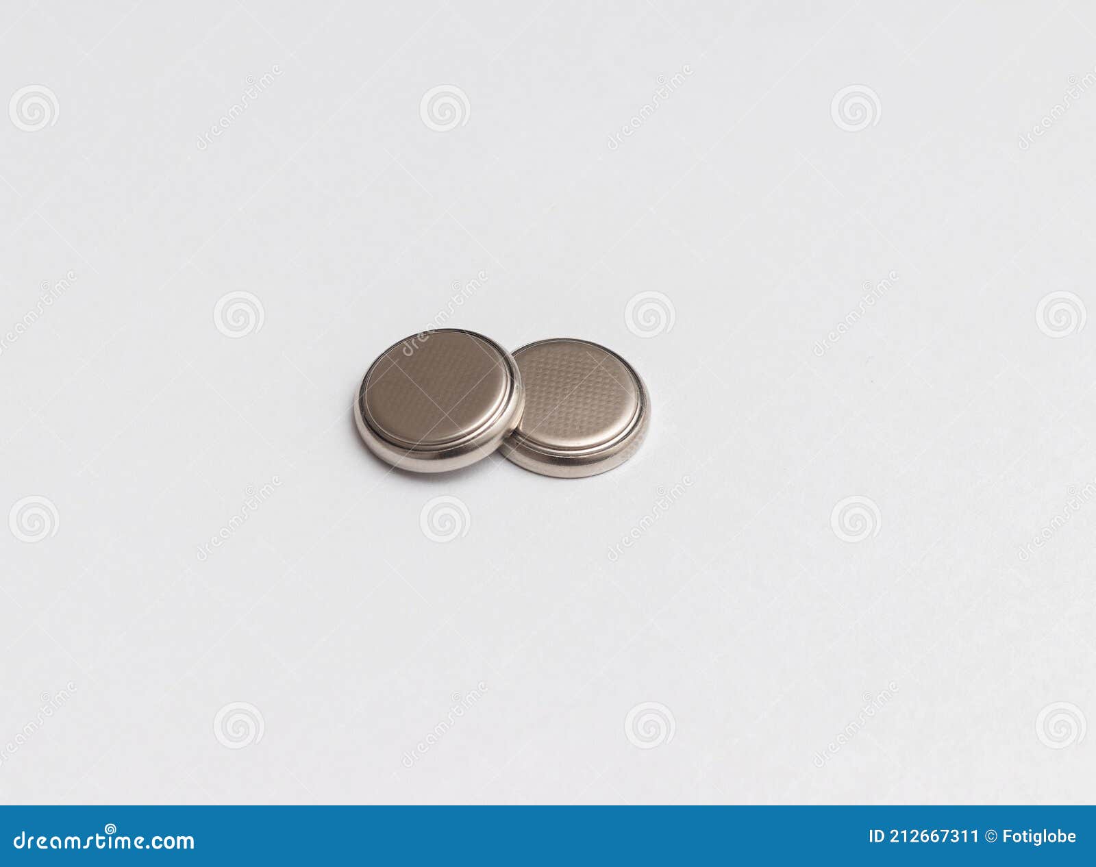 Two Button Cell or Disk Cell Batteries Isolated on White Background ...