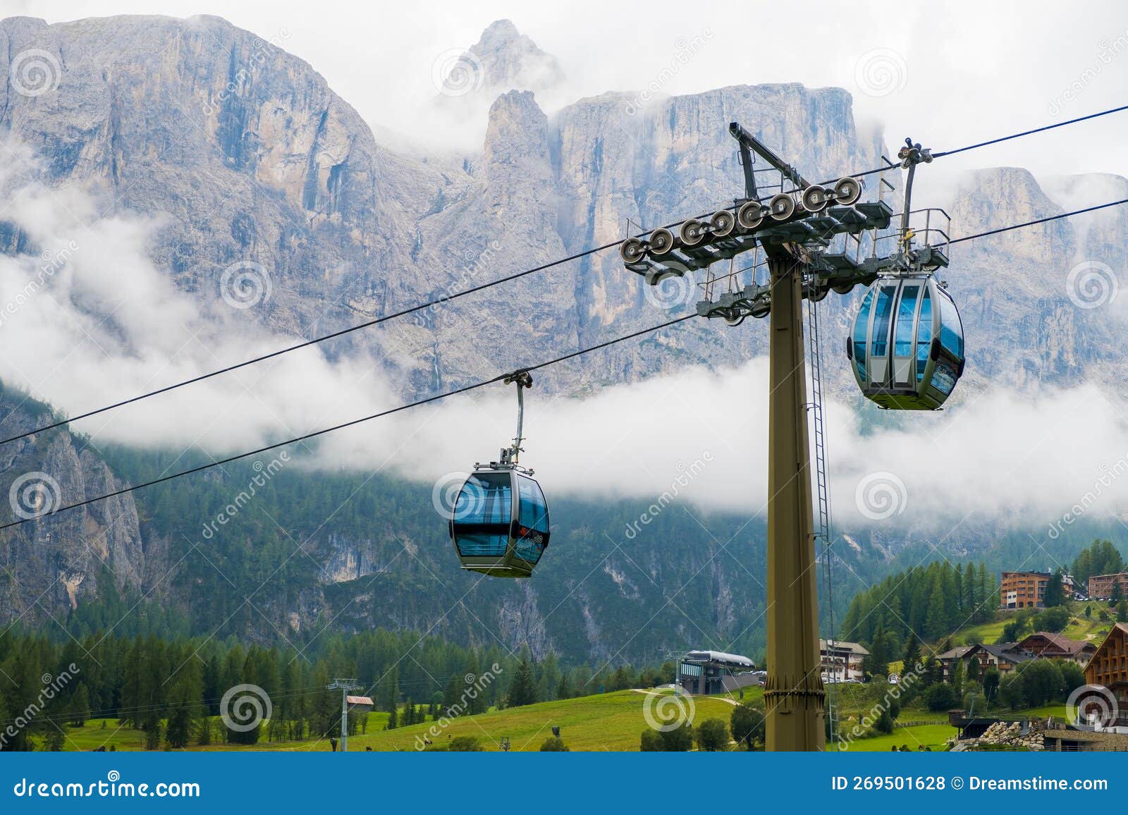 Two Cable Way Cabins Against the Dolomites Covered with Clouds Stock ...