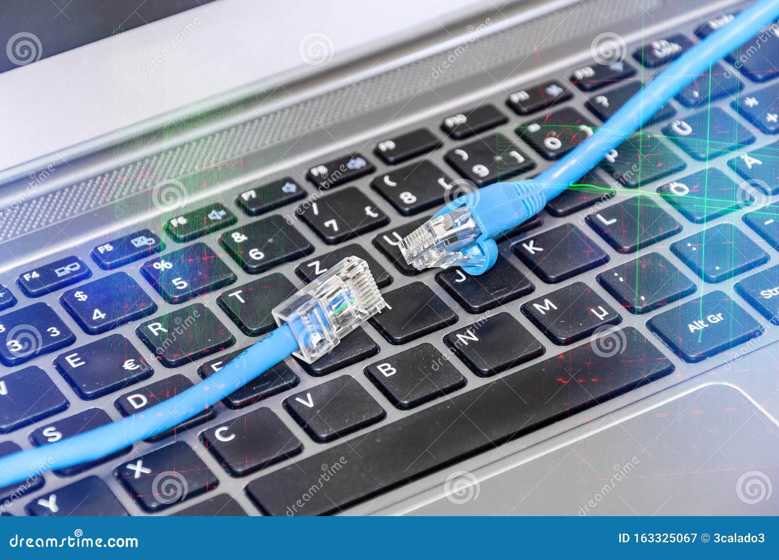 Two Cables on Computer Keyboard Symbolizing Connection To Cyberspace ...