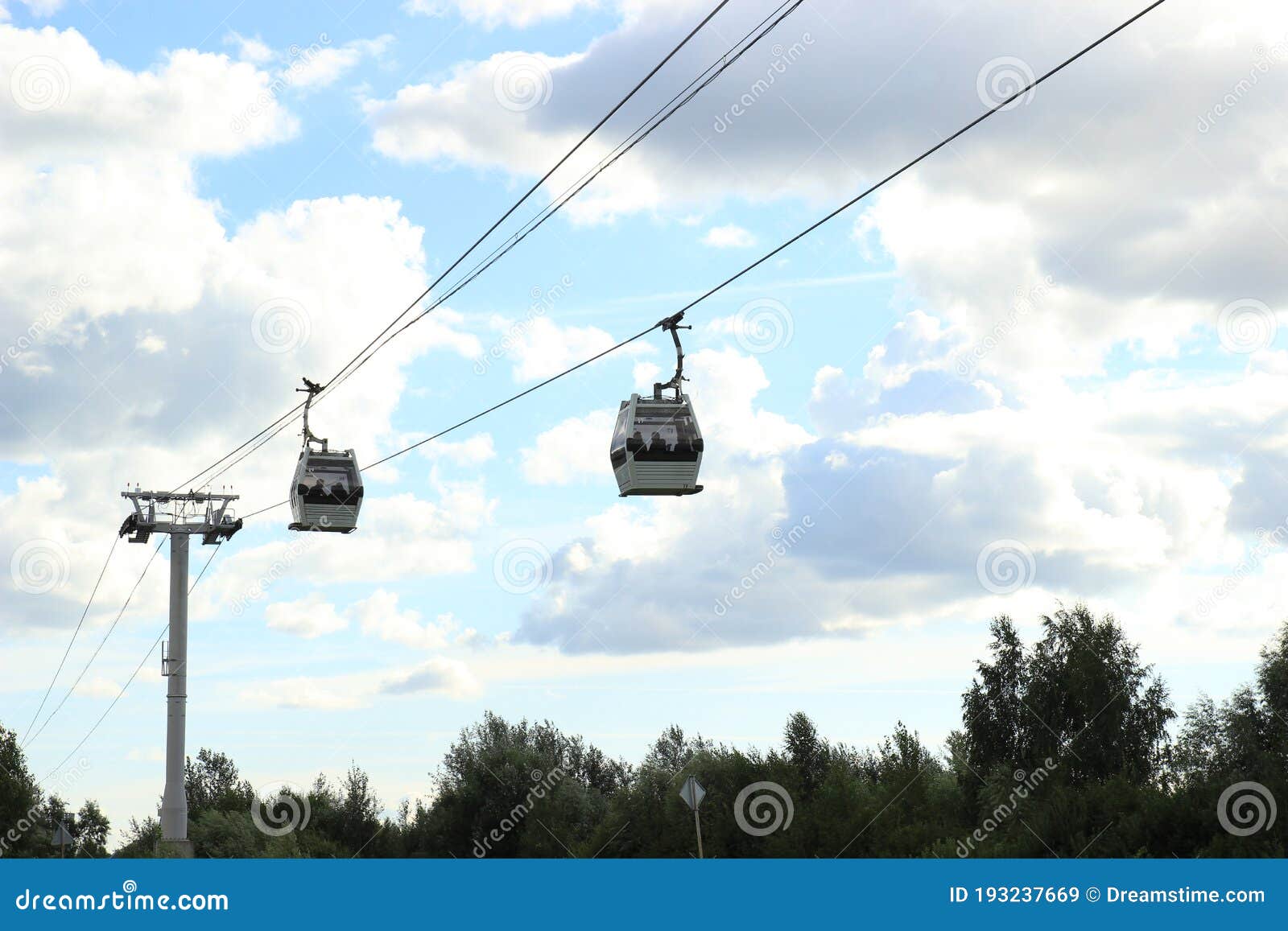 Two Cabs Cable Car Against the Blue Sky with Clouds Stock Image - Image ...