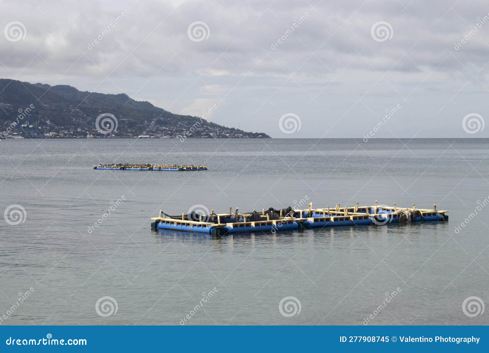 Two Cages or a Place To Keep Fish in the Sea Stock Image - Image of ...