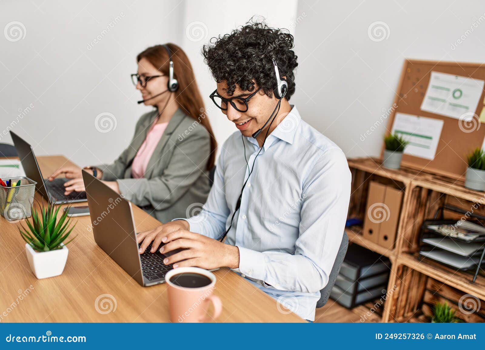 Two Call Center Agent Smiling Happy Working at the Office Stock Photo ...