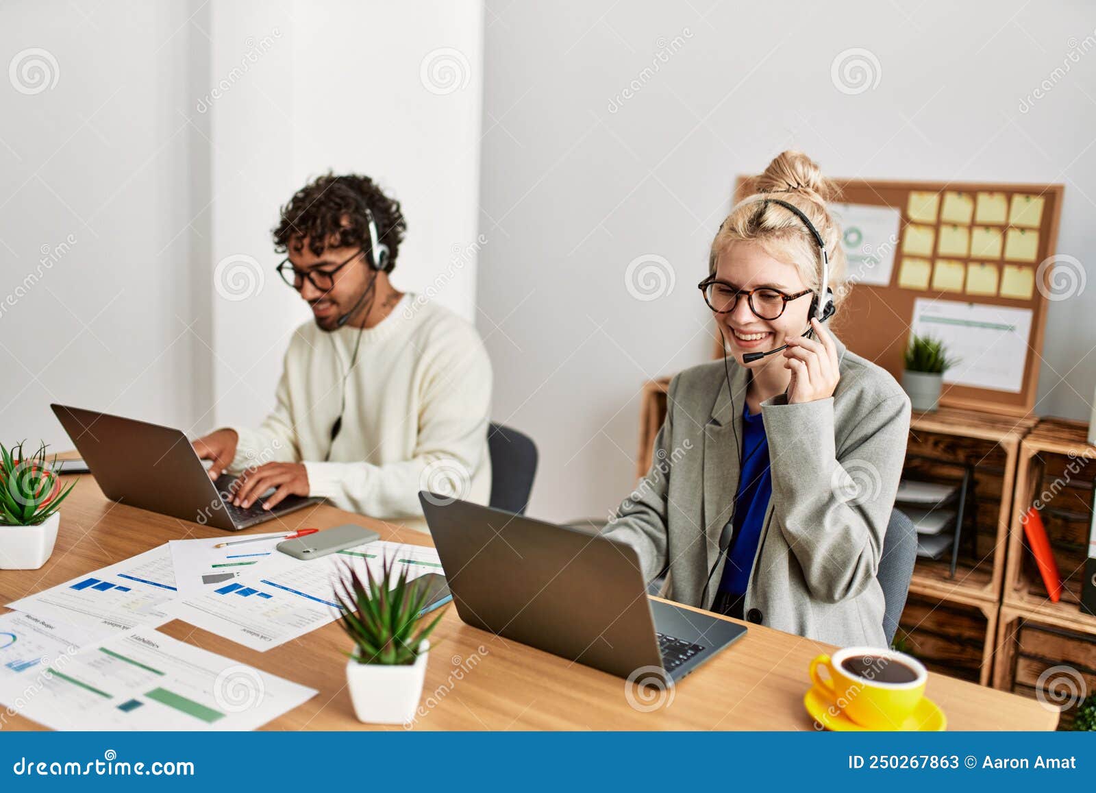 Two Call Center Agents Working at the Office Stock Image - Image of ...