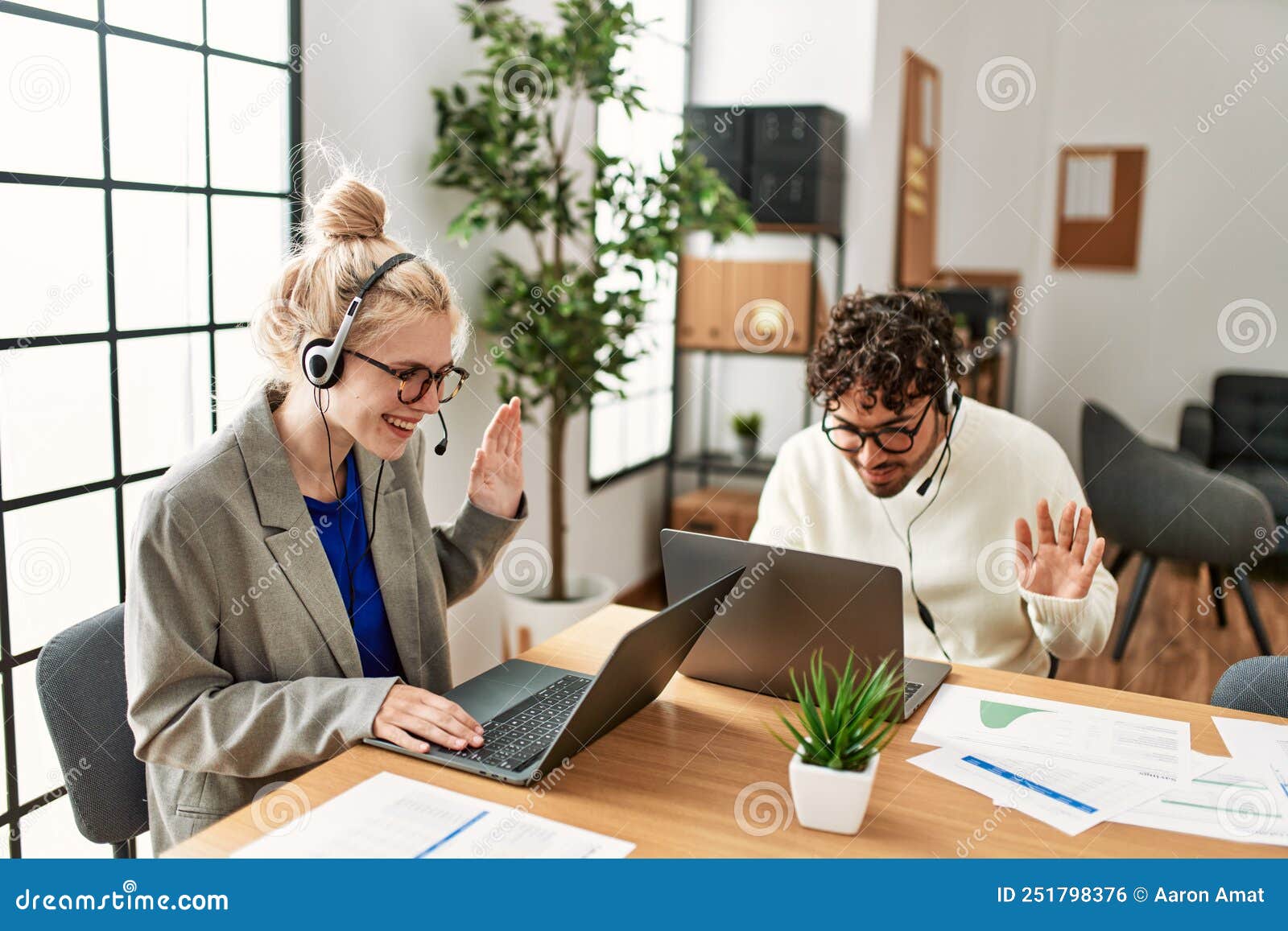 Two Call Center Agents Working at the Office Stock Photo - Image of ...