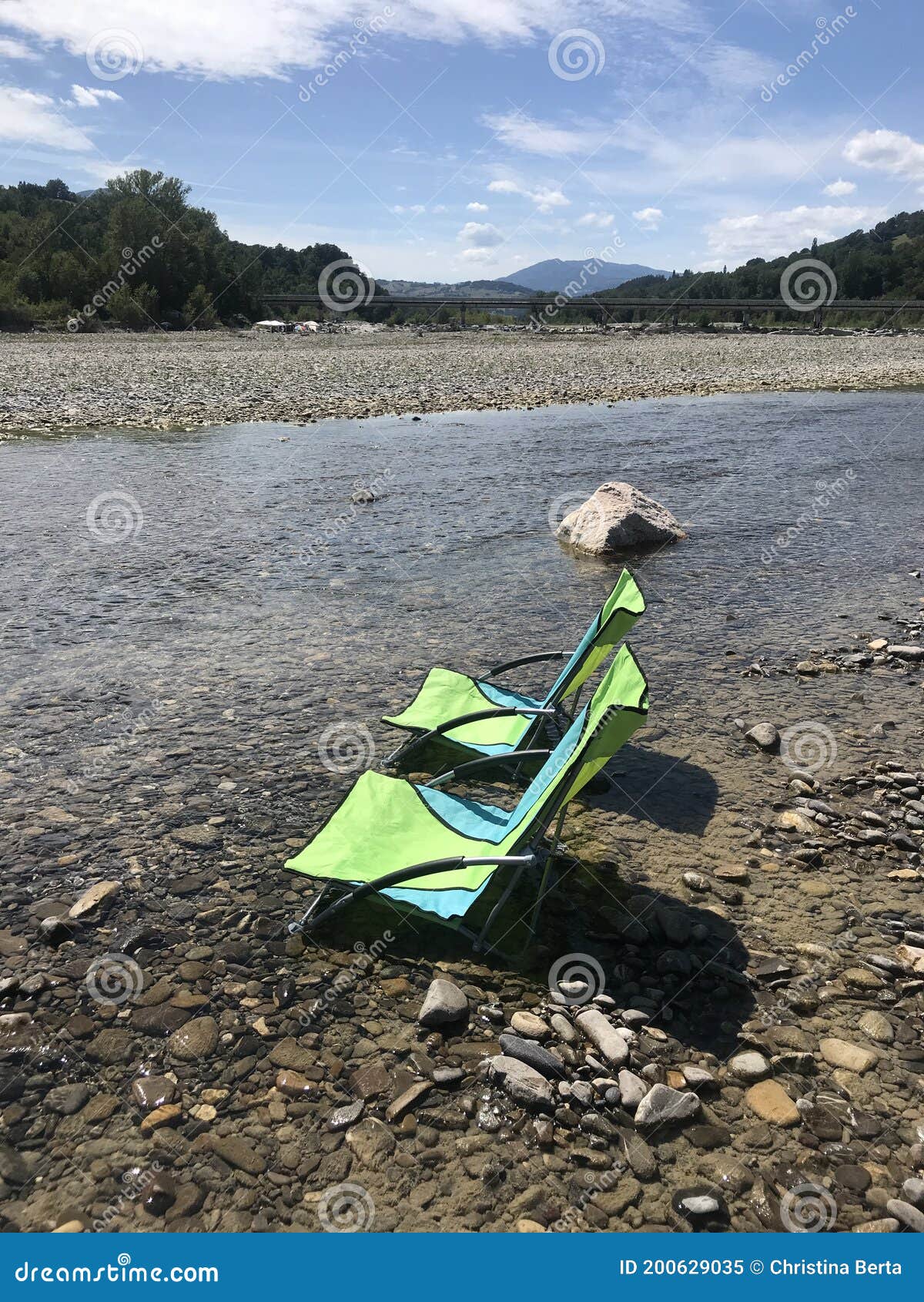 Two Camping Chairs in the River Stock Image - Image of middle, quiet ...