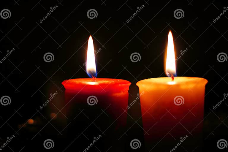 Two candles burning stock photo. Image of fire, spirituality - 78904774
