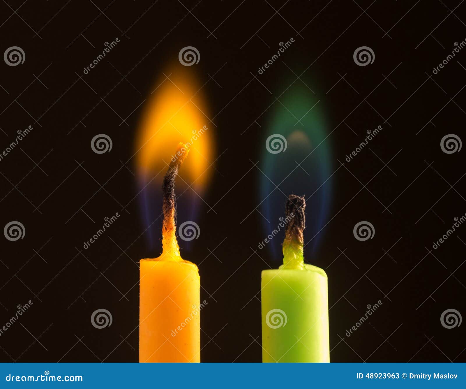 Two candles stock image. Image of fire, yellow, color - 48923963