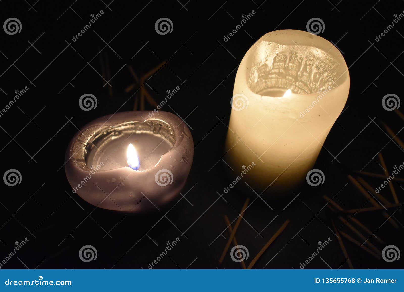 Two candles on a table stock photo. Image of background - 135655768
