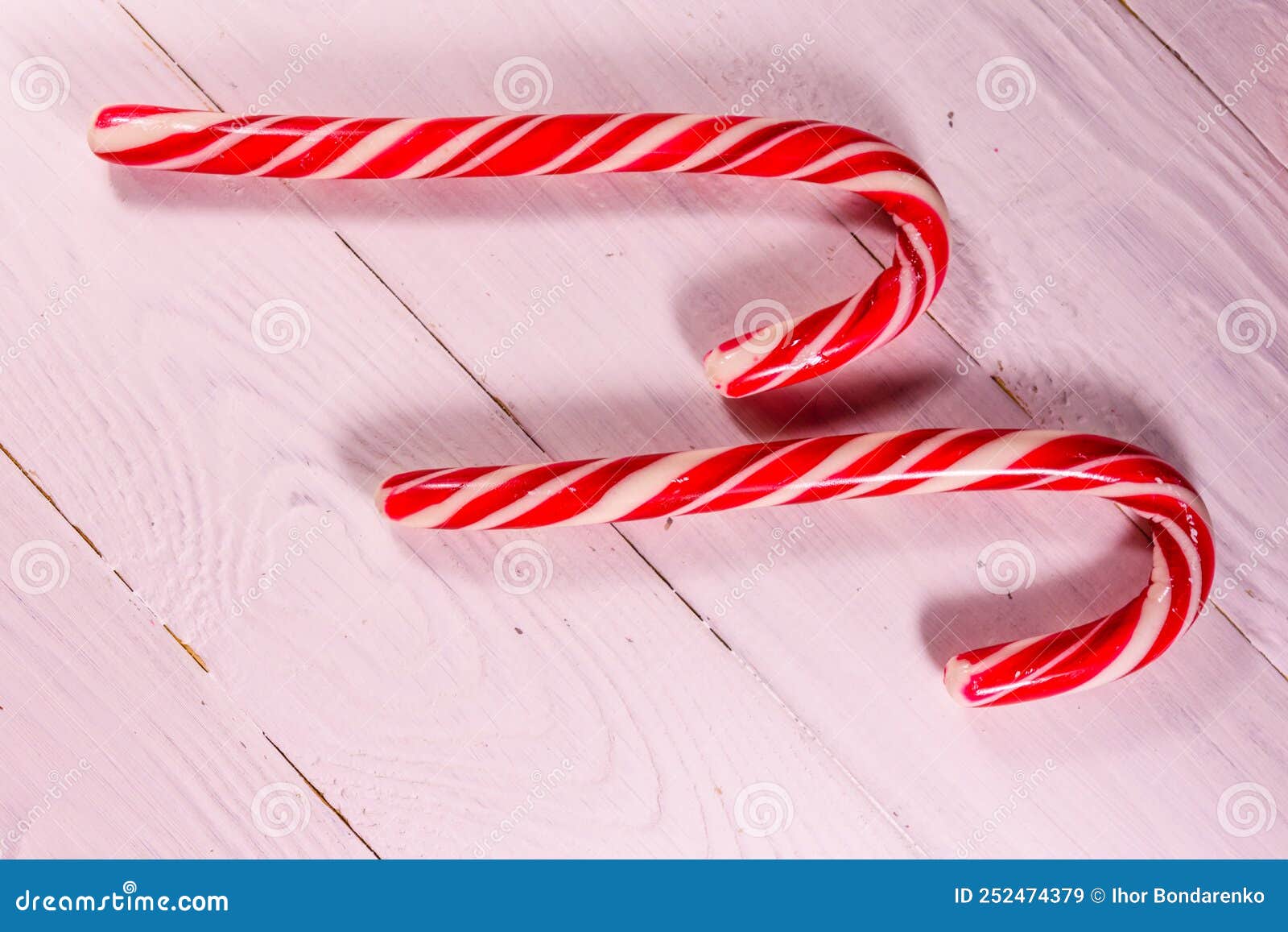 Two Candy Canes on a Wooden Table. Top View Stock Image - Image of cane ...