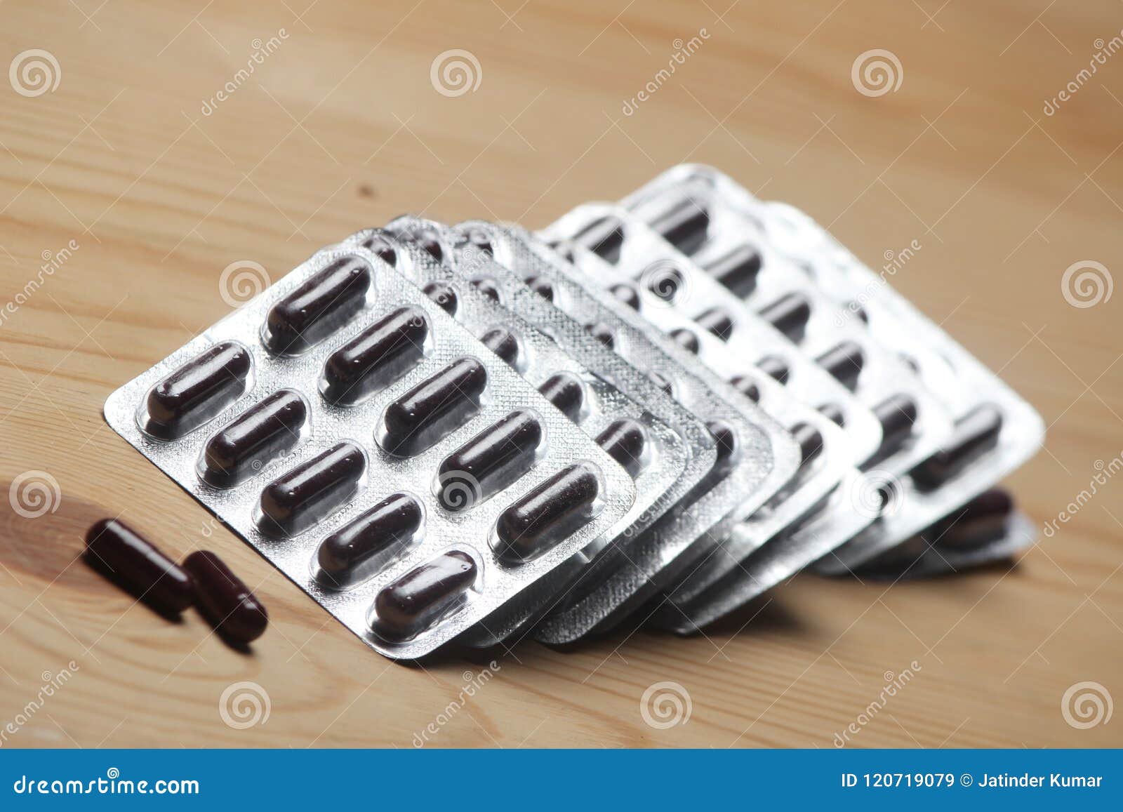 Two Capsule on Table with Capsule Blister Pack Stock Image - Image of ...