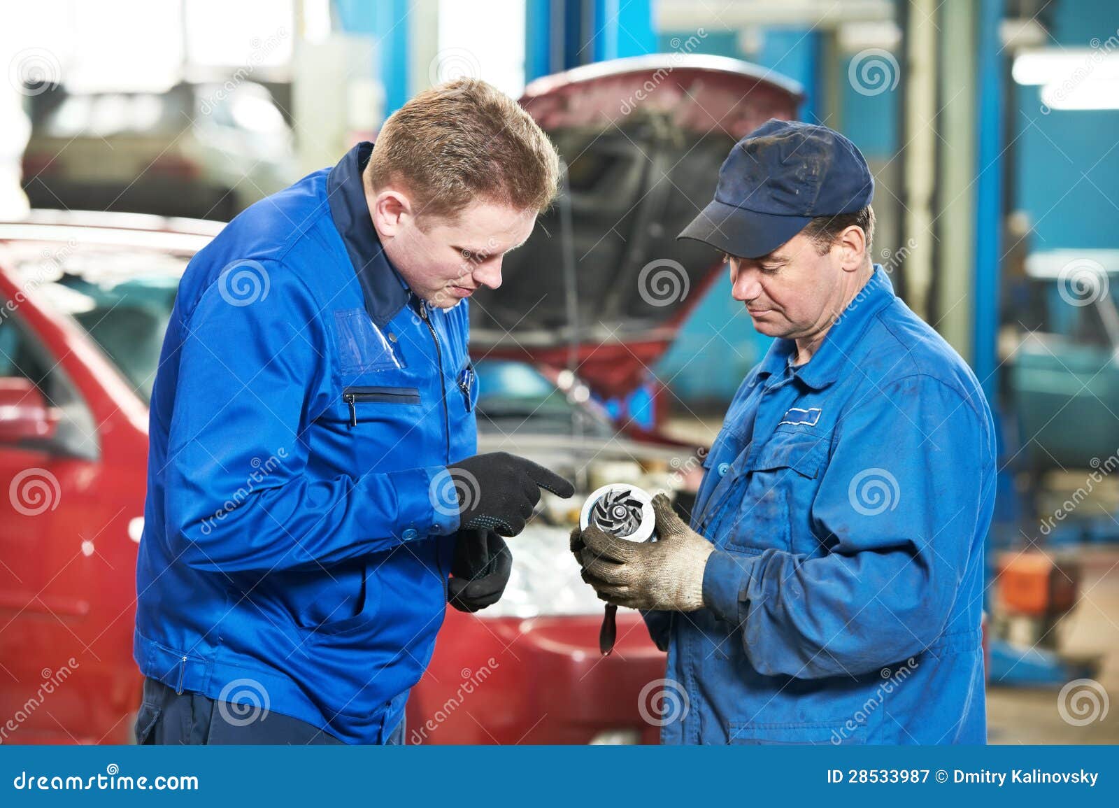 Two Car Mechanic Diagnosing Auto Engine Problem Stock Image - Image of ...