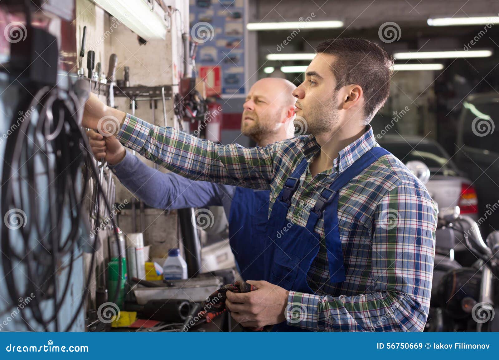 Two Car Mechanics at Workshop Stock Image - Image of indoors, helper ...