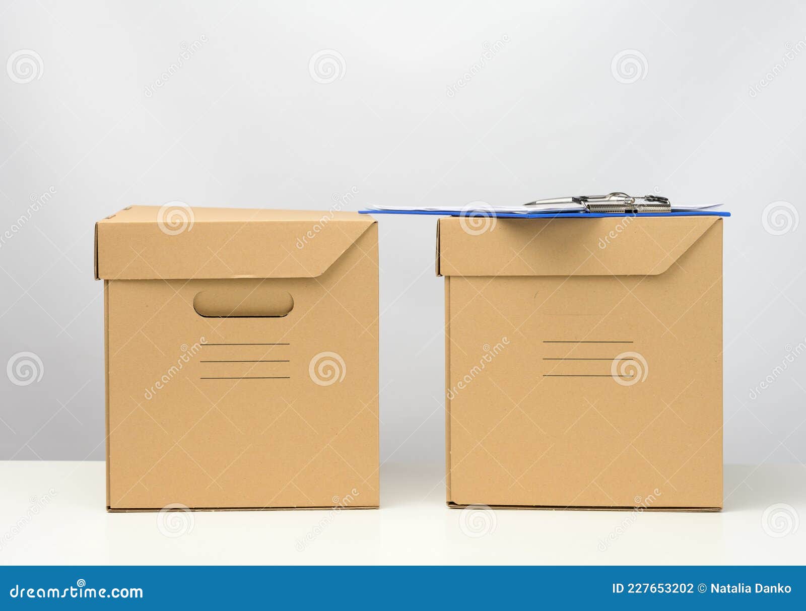 Two Cardboard Boxes Made of Brown Corrugated Cardboard are on a White ...
