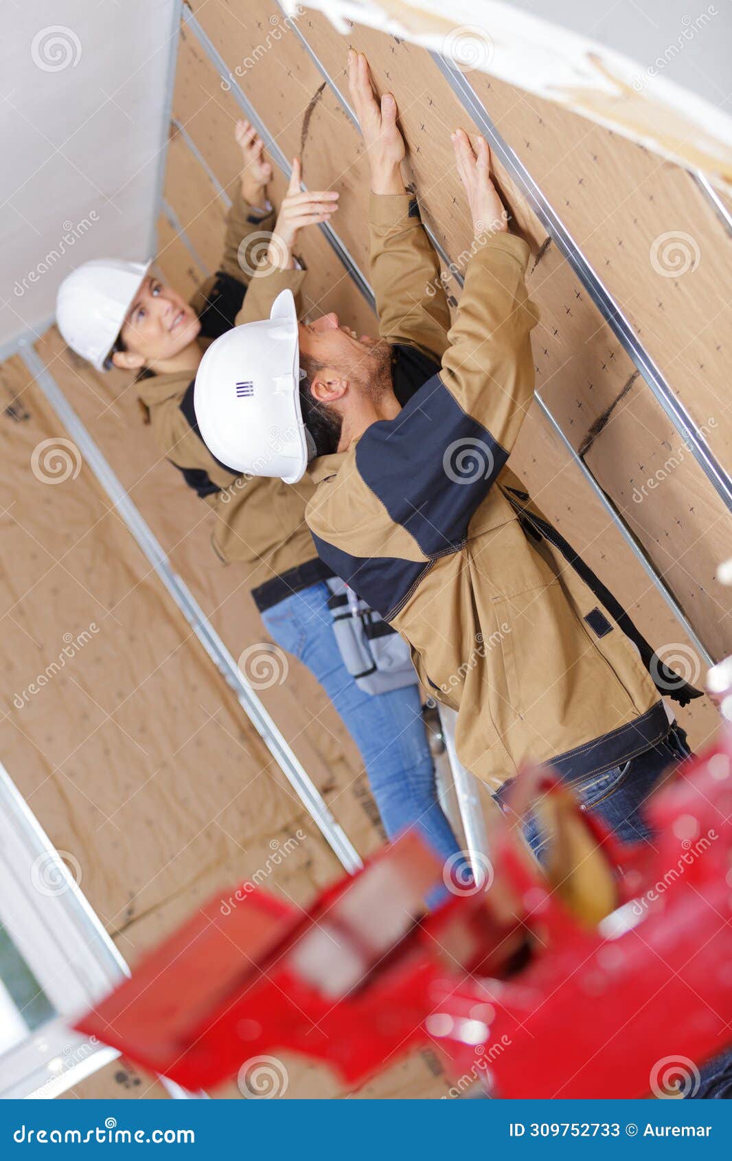 Two Carpenters Cooperating with Each Other and Working Stock Image ...
