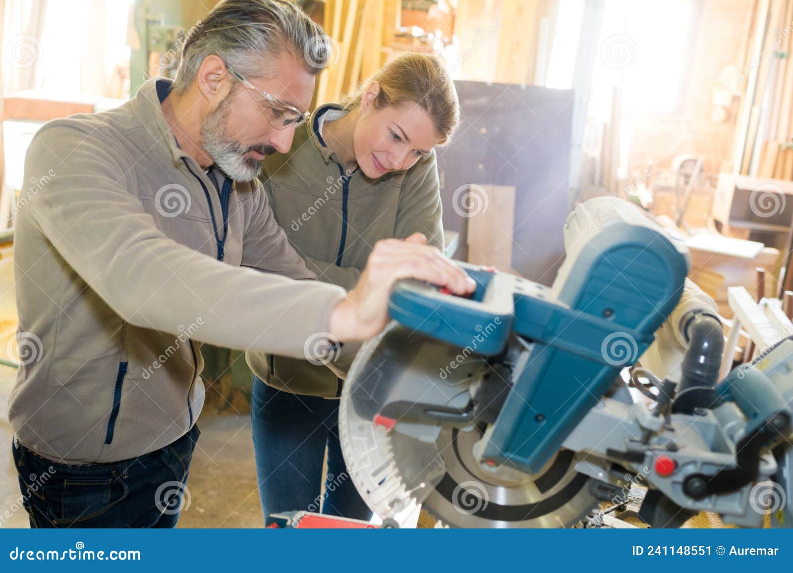 Two Carpenters Using Circular Saw Stock Image - Image of occupation ...