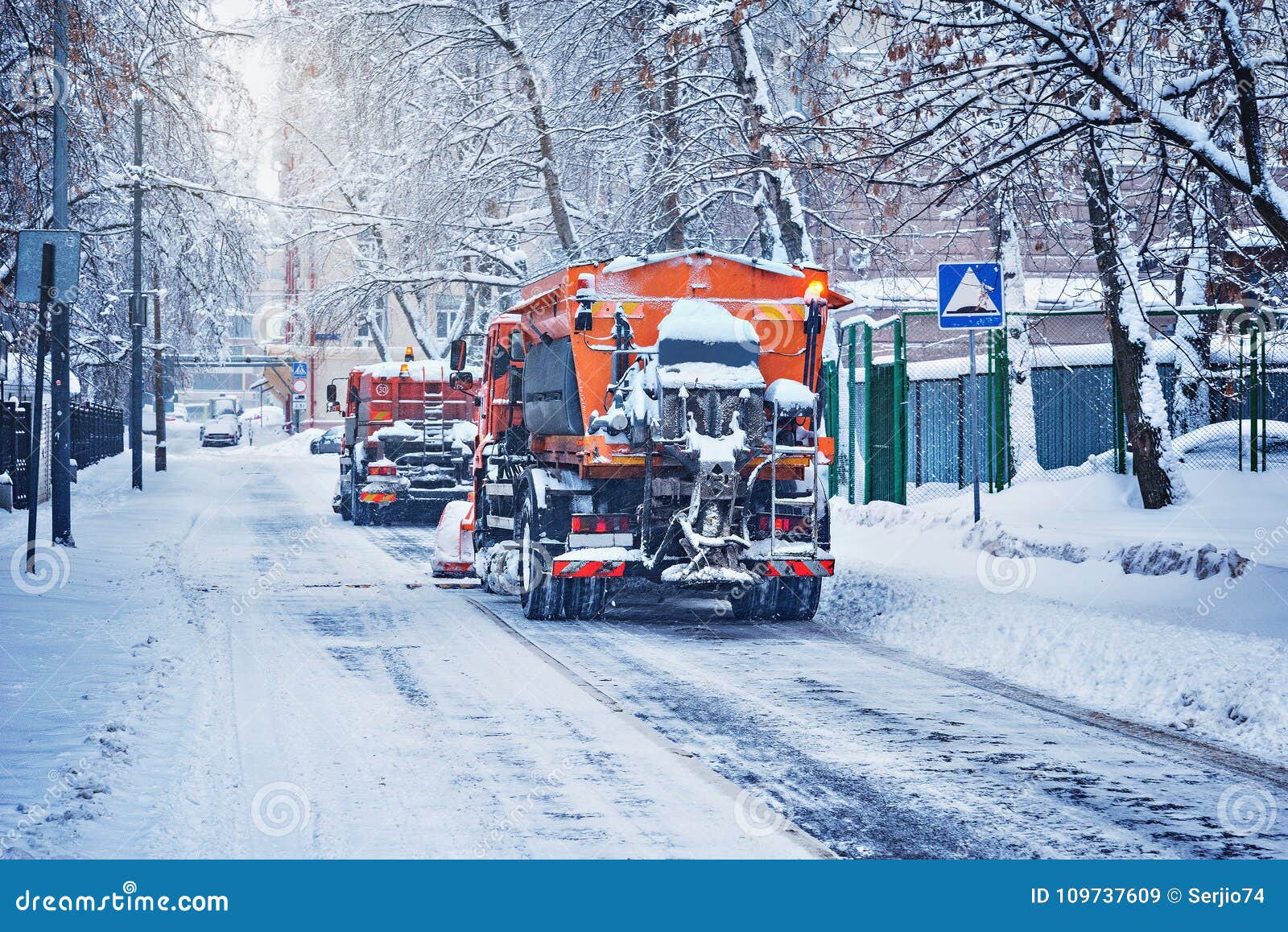 Two cars clean snow. stock image. Image of street, snowy - 109737609