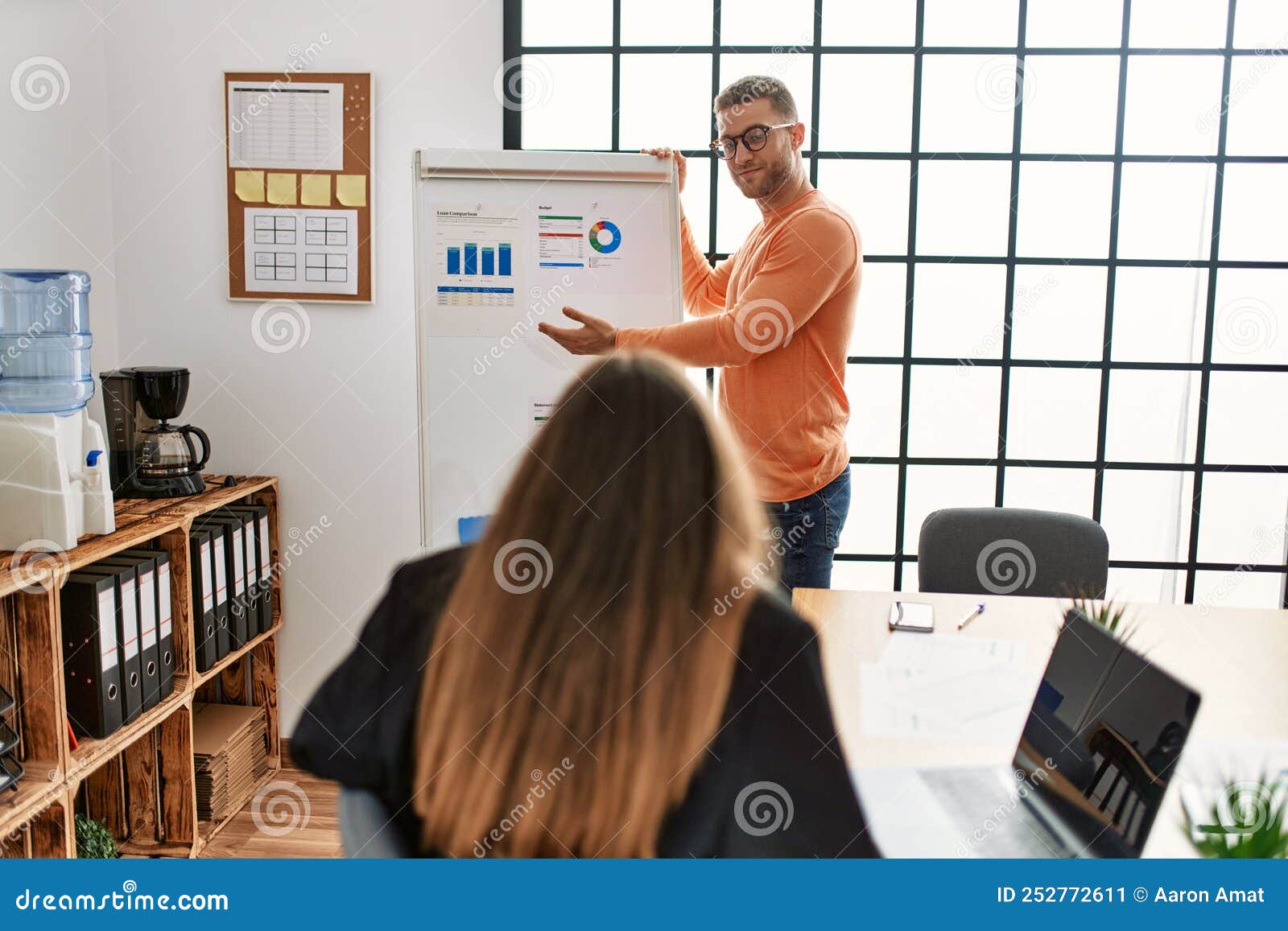 Two Caucasian Business Executives on Chart Presentation at the Office ...