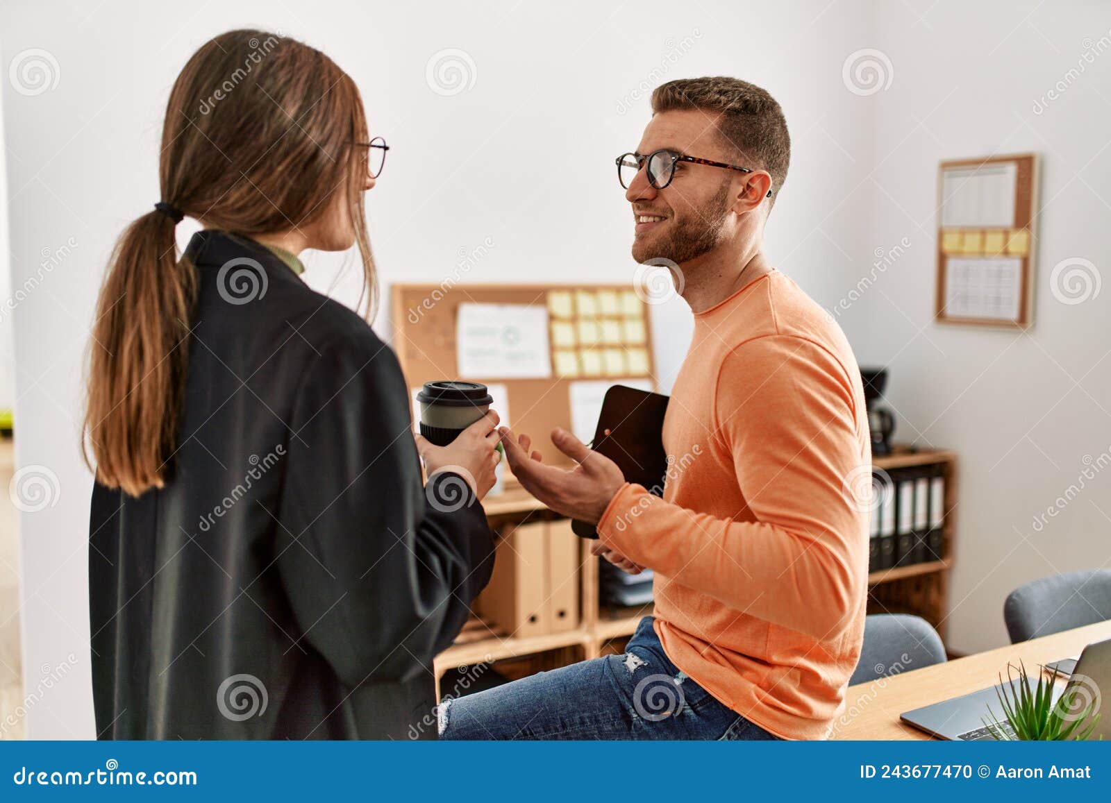 Two Caucasian Business Executives Talking and Drinking Coffee at the ...
