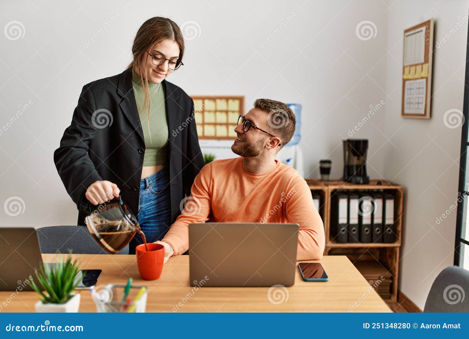 Two Caucasian Business Executives Working and Drinking Coffee at the ...